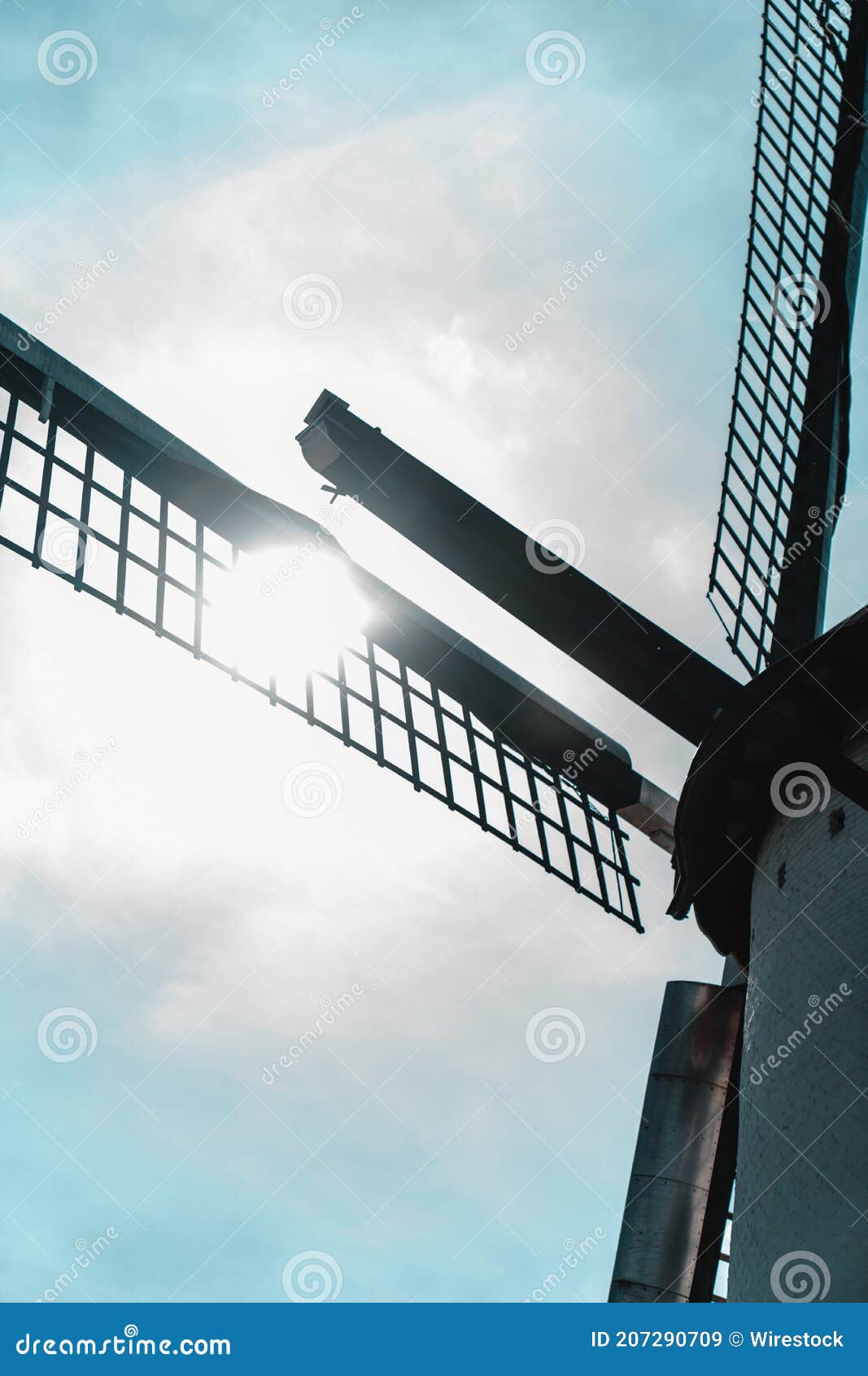 Vertical Shot of Traditional Windmill Wings in the Sunlight Stock Image ...