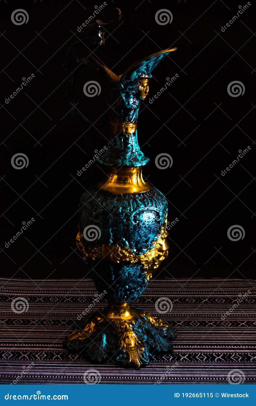 Vertical Shot of a Traditionally Decorated Pitcher on a Black ...