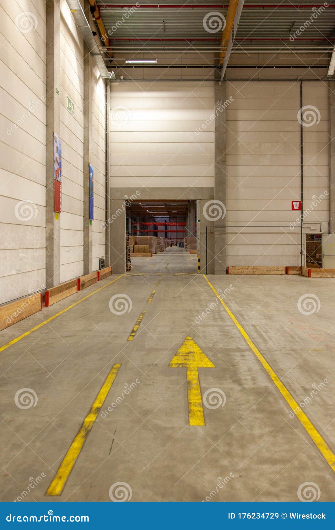 Vertical Shot of a Traffic Lane in a Warehouse Stock Image - Image of ...