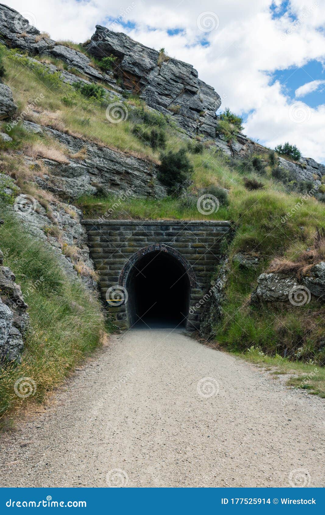 Vertical Shot of a Tunnel Built Inside a Mountain Stock Photo - Image ...