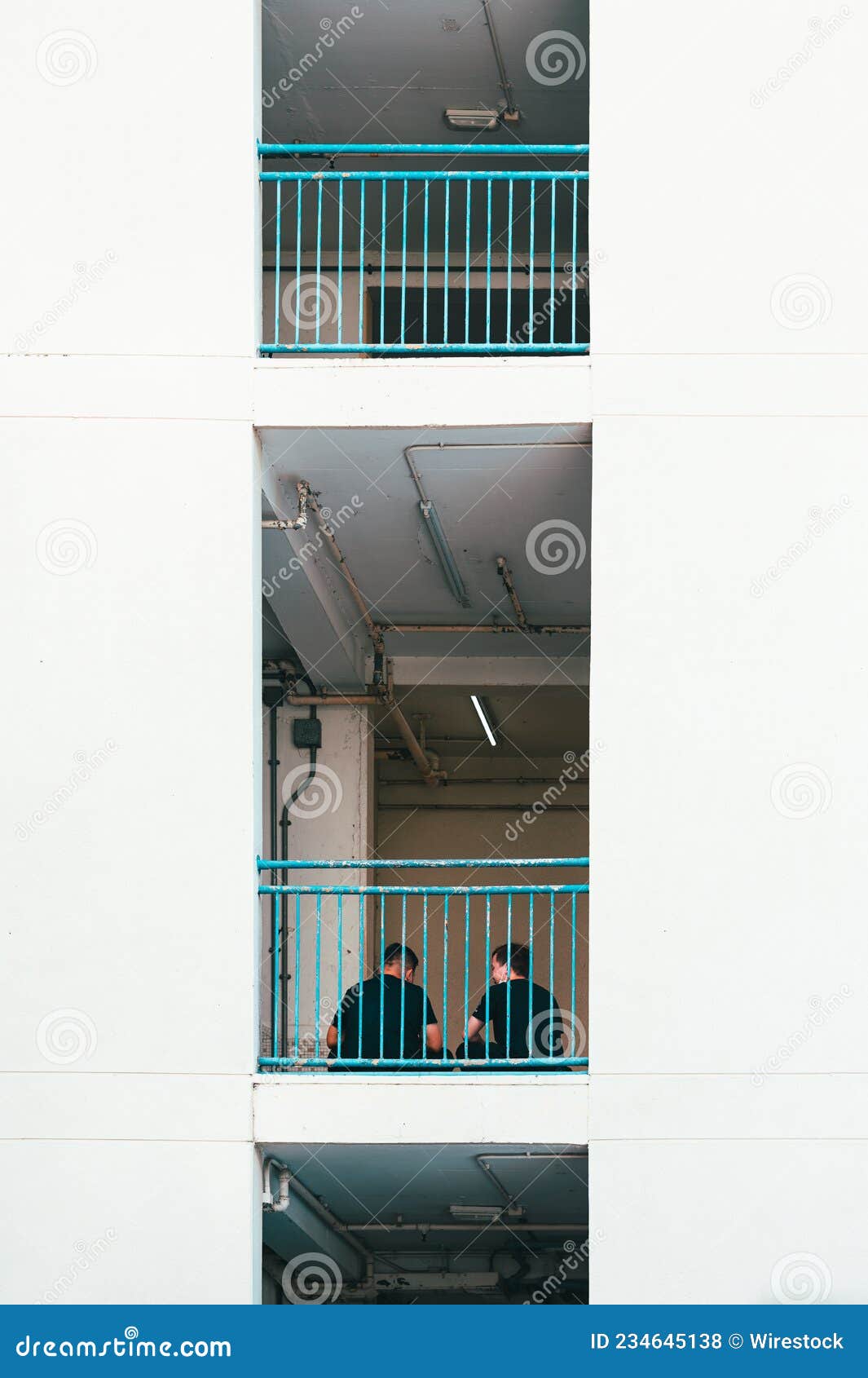 Vertical Shot of Two Men Talking on the Balcony Editorial Stock Photo ...