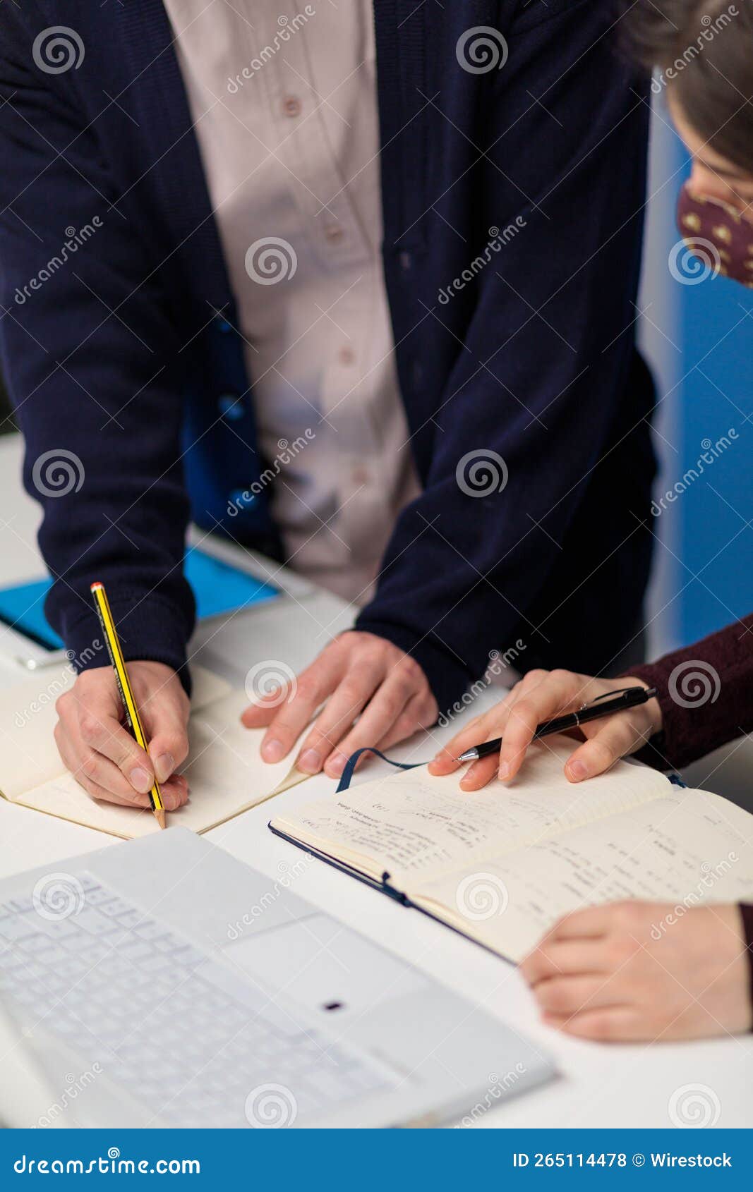 Vertical Shot of Two Office Workers Signing a Document Stock Photo ...
