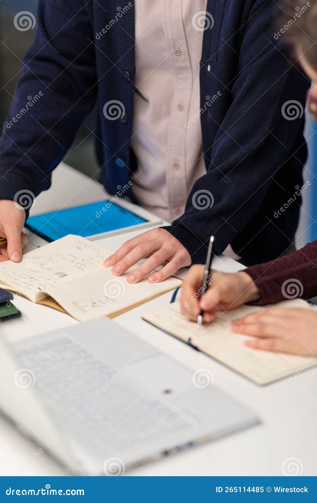 Vertical Shot of Two Office Workers Signing a Document Stock Image ...