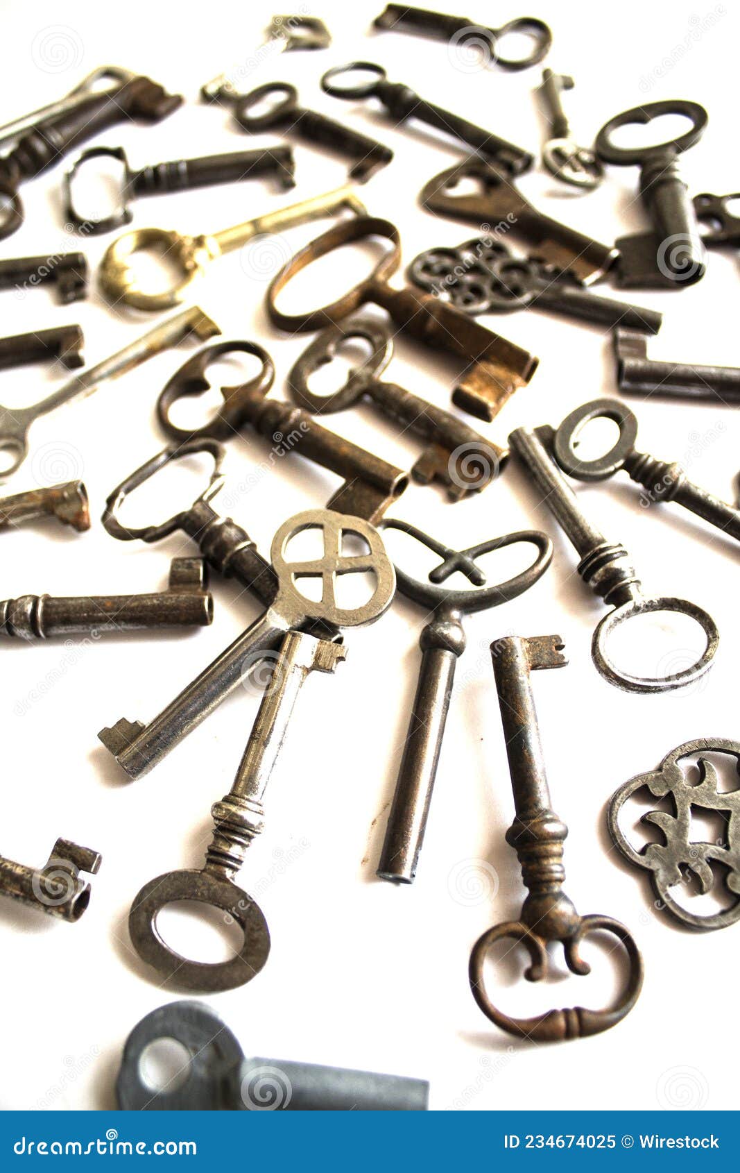 Vertical Shot of Vintage Keys on a White Background Stock Image - Image ...
