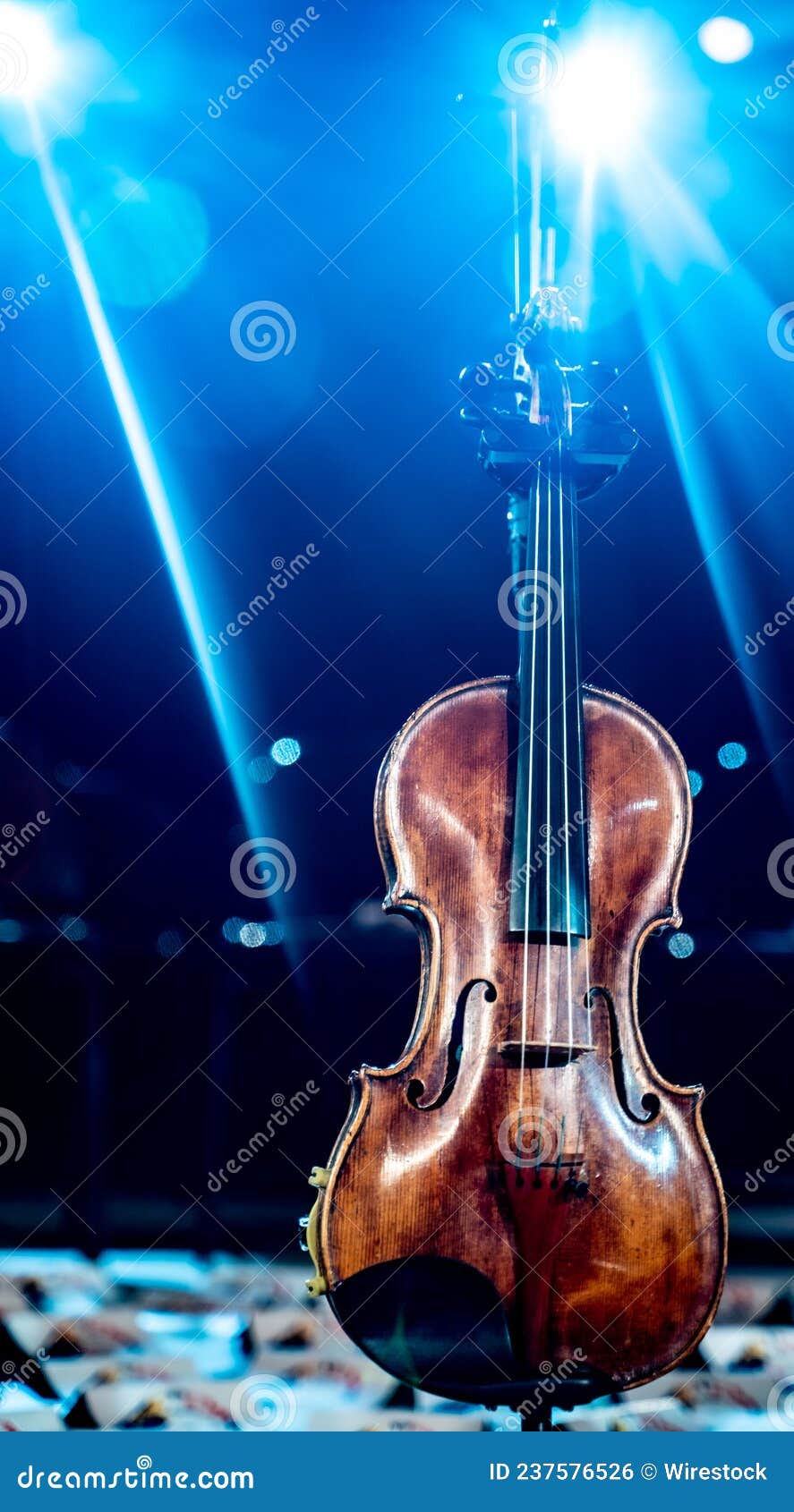 Vertical Shot of a Violin on a Stage at a Concert Stock Photo - Image ...