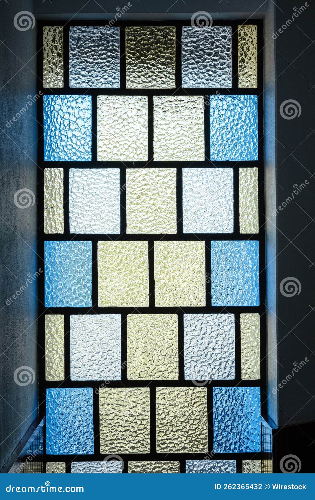 Vertical Shot of a Vitrage Window in Blue and Yellow Colors Stock Photo ...