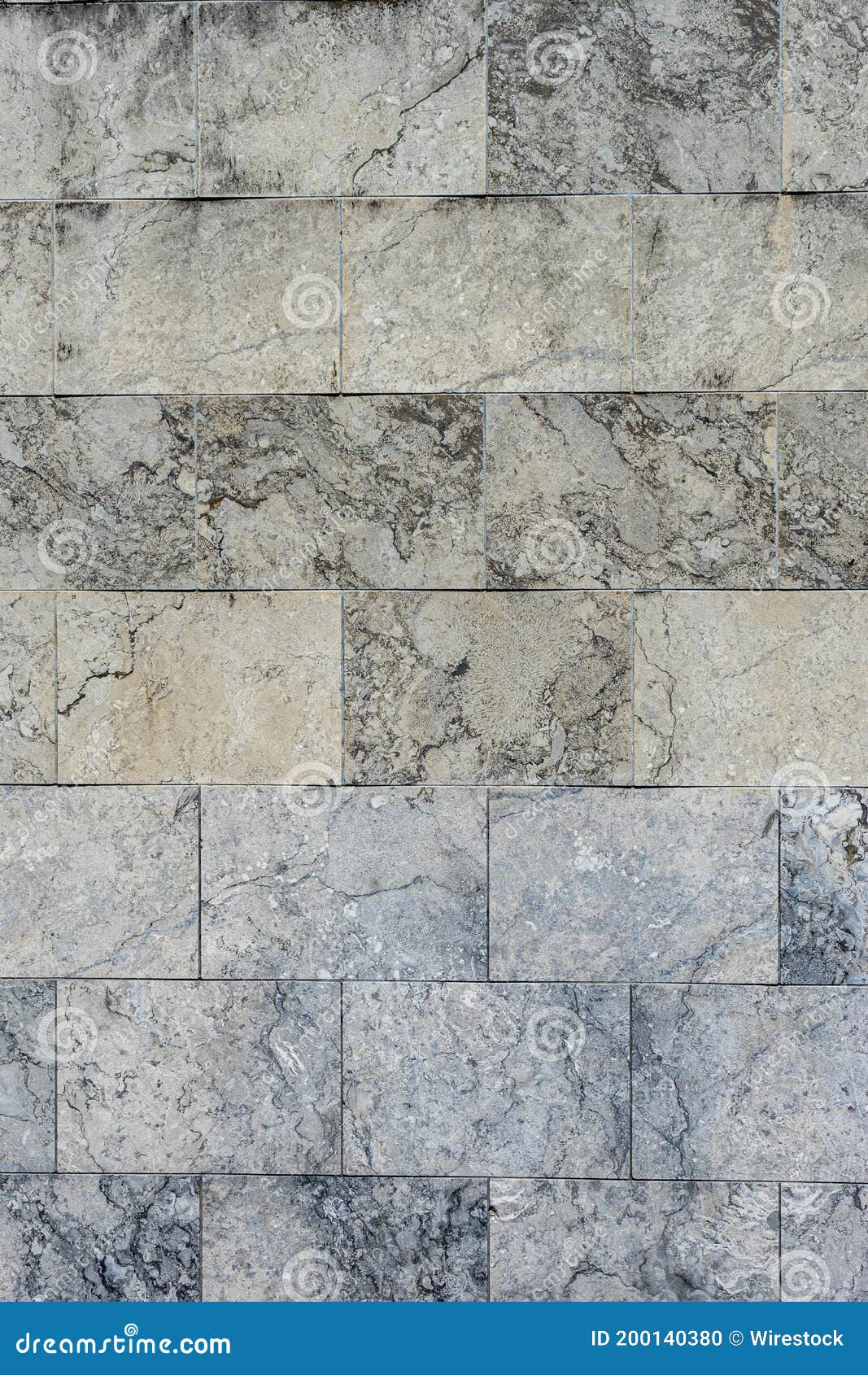 Vertical Shot of a Wall Made of Square Marble Tiles Stock Photo - Image ...