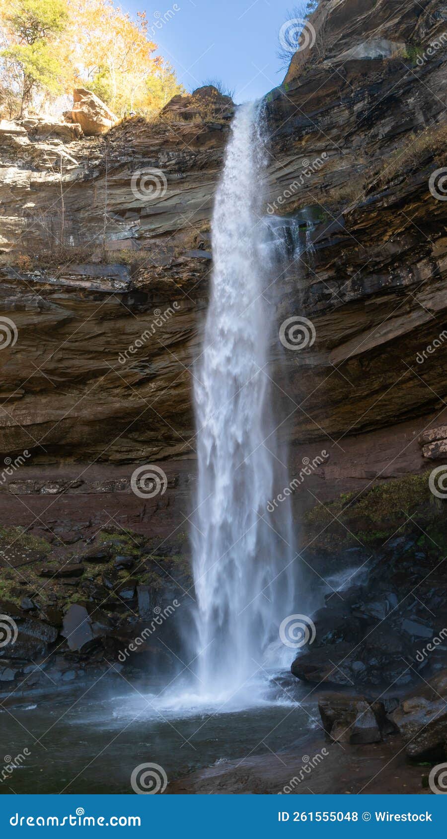 Vertical Shot of a Waterfall in a Sunny Weather Stock Photo - Image of ...