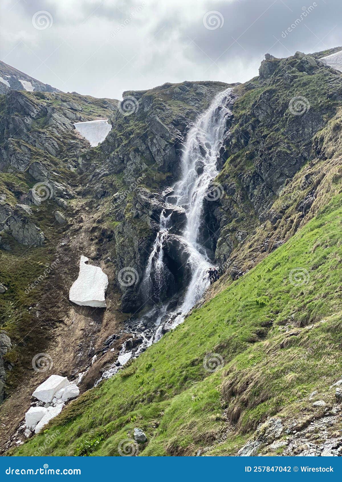 Vertical Shot of a Waterscape Falling Down the Rocks Stock Photo ...