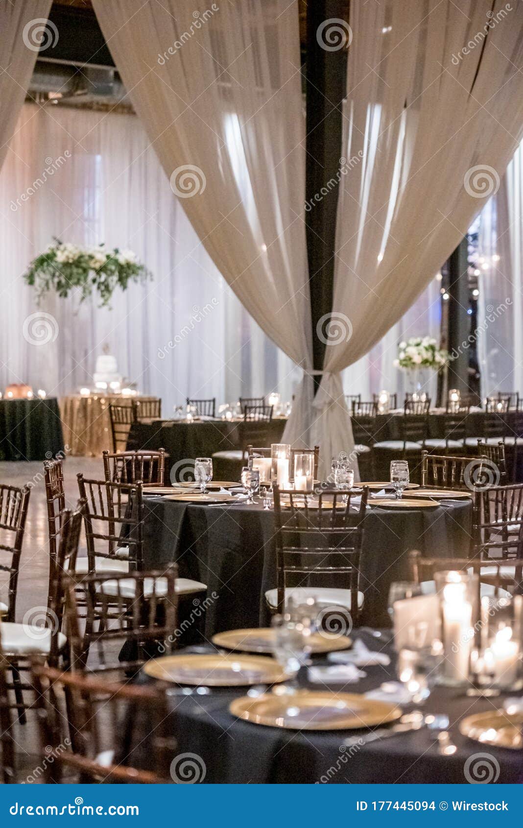 Vertical Shot of a Wedding Hall with Elegant Table Setting Stock Photo ...