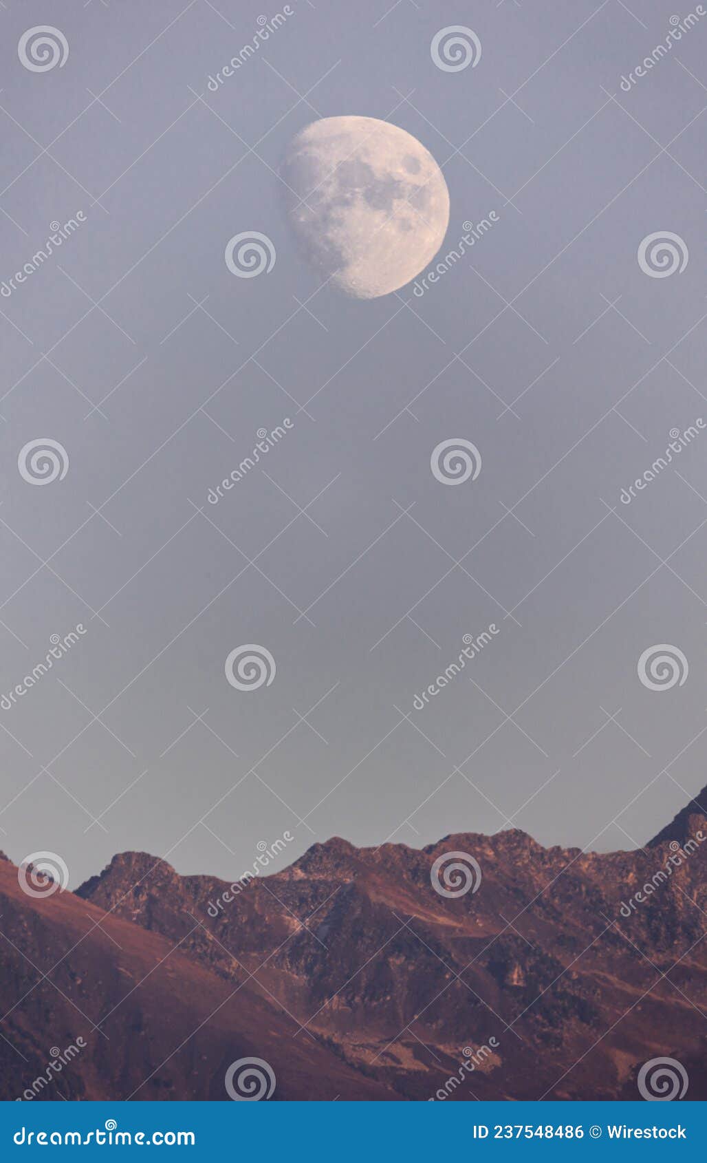 Vertical Shot of a White Half-moon Over Cliffs Stock Photo - Image of ...