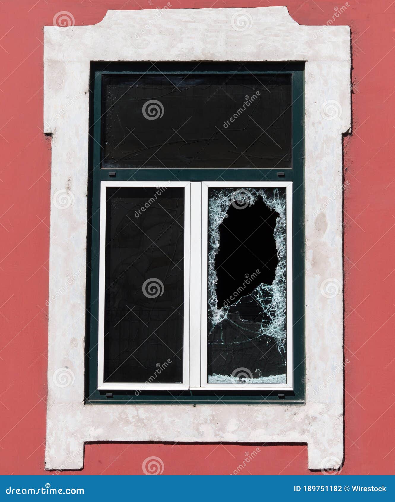 Vertical Shot of a Window with Broken Glass on a Red Building Stock ...