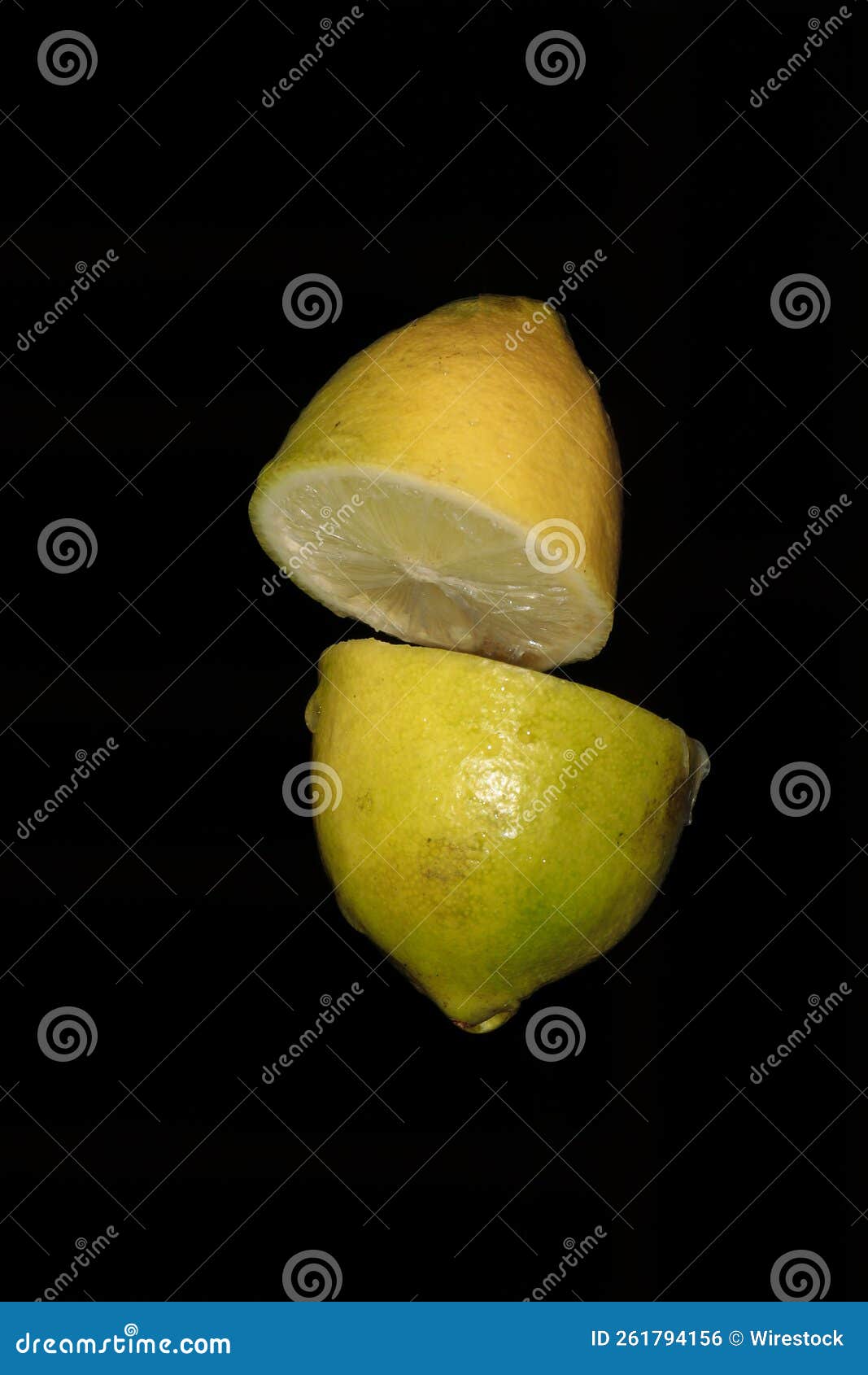 Vertical Shot of Yellow Lemon Slices Isolated on Black Background Stock ...