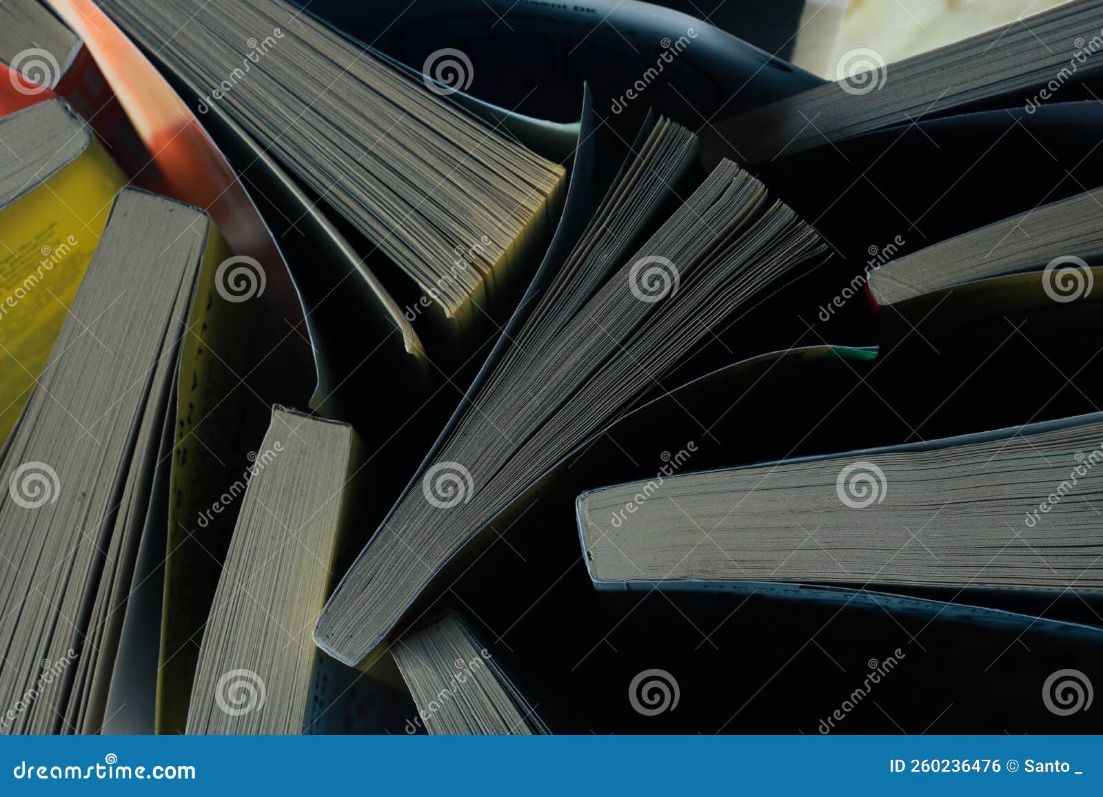 Vertical Stack of Books with Silhouette in City Library Stock Photo ...