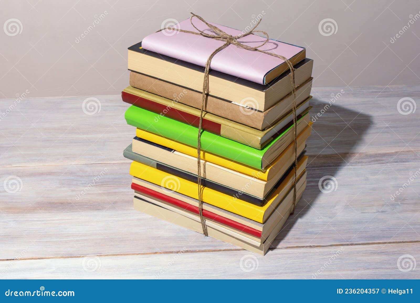 Vertical Stack of Different Books Tied with Rope Stock Image - Image of ...