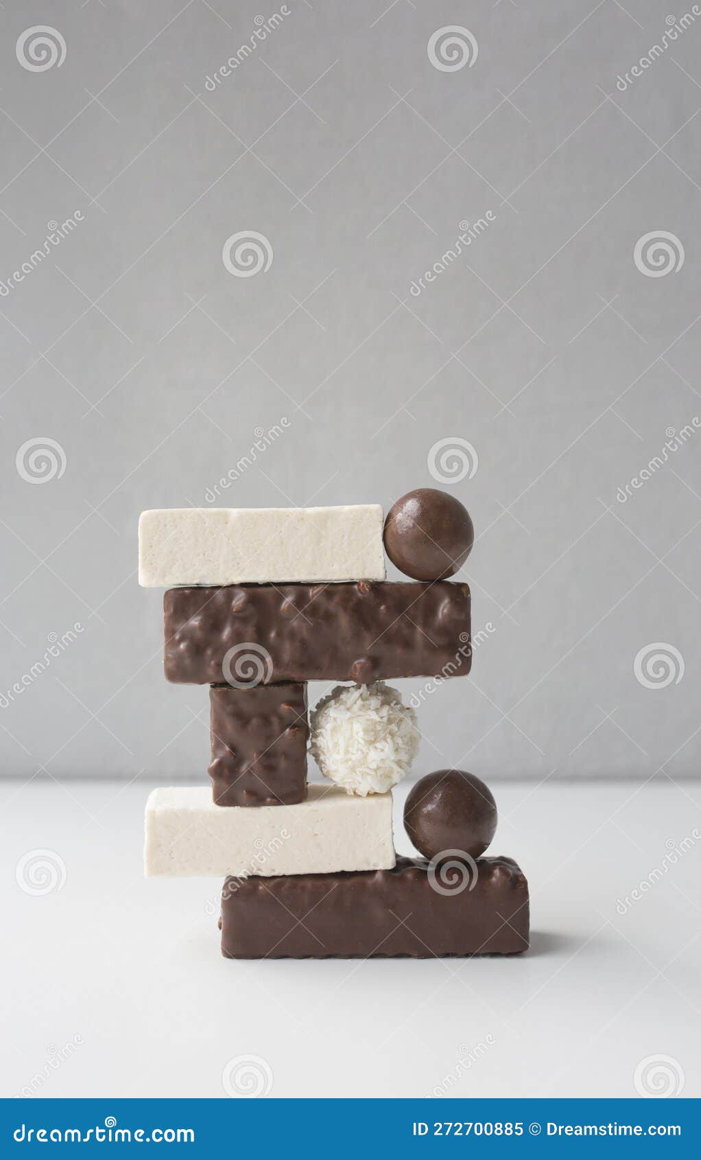 Vertical Stack of Many Sweet Snacks, Balance Concept. Stock Image ...