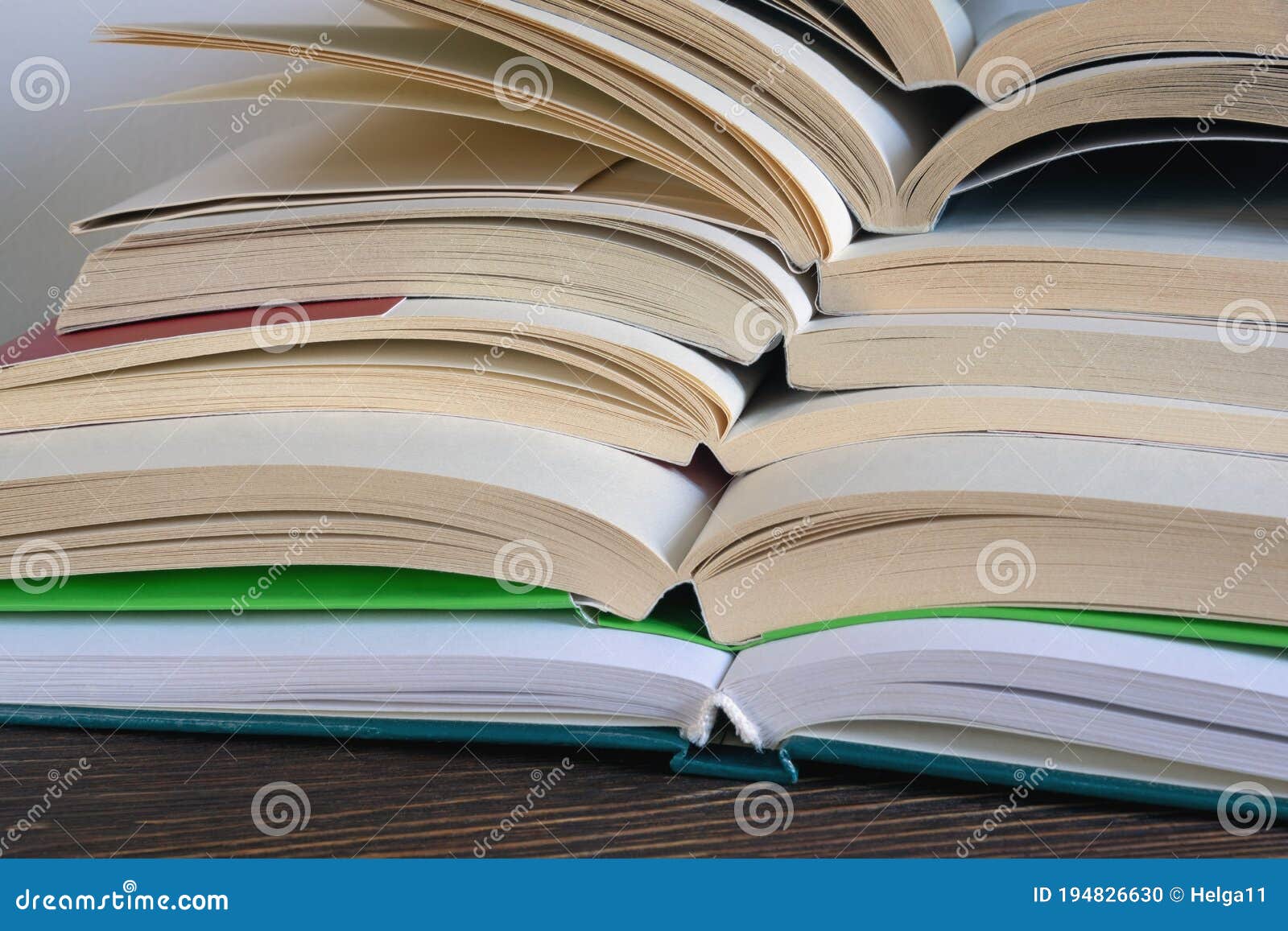 Vertical Stack of Open Books Stock Photo - Image of read, multicoloured ...