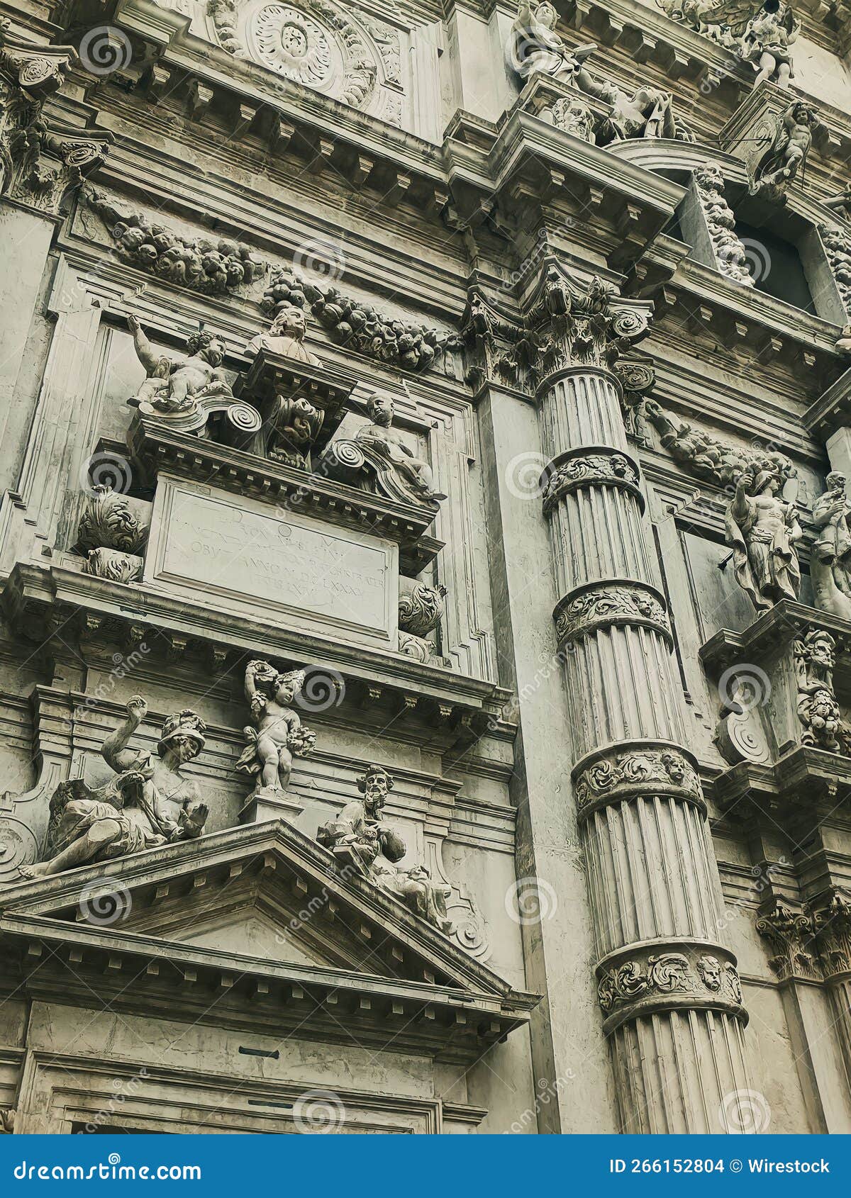 Vertical of Statues and Sculptures on a Wall of an Ancient Building ...