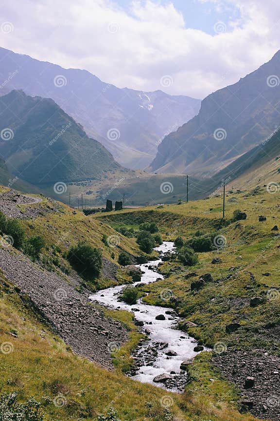 Vertical of a Stream Flowing through a Valley. Stock Image - Image of ...