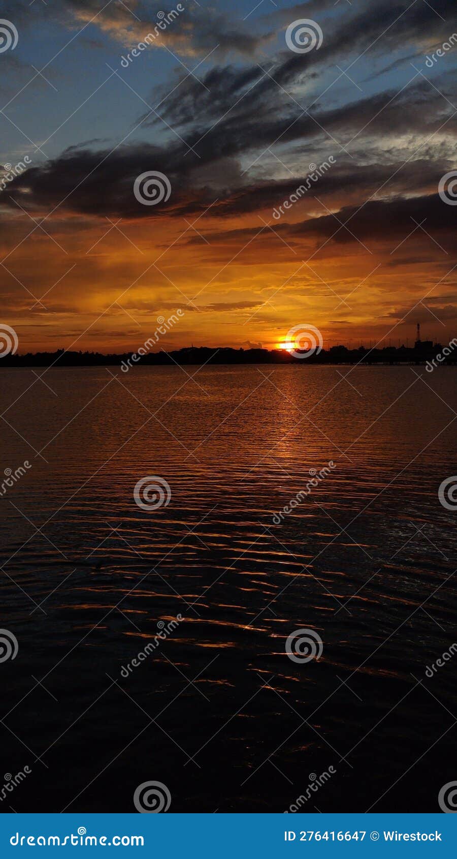 Vertical of Stunning Sunset Over a Tranquil Lake Stock Image - Image of ...