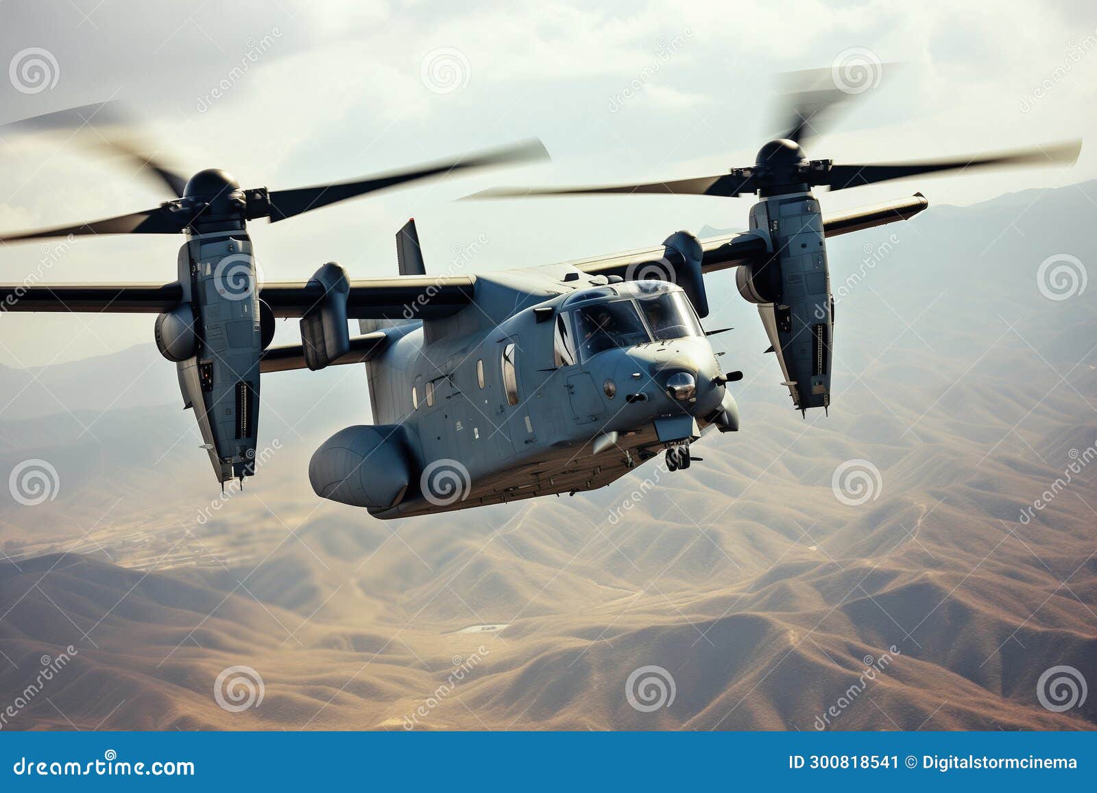 Vertical Takeoff V-22 Osprey Flying High Above the Mountains Stock ...