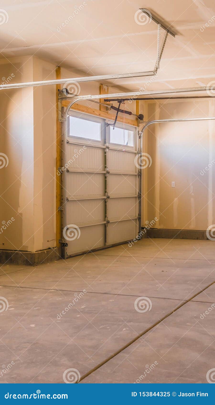 Vertical Tall Frame Interior of a Garage Under Construction with ...