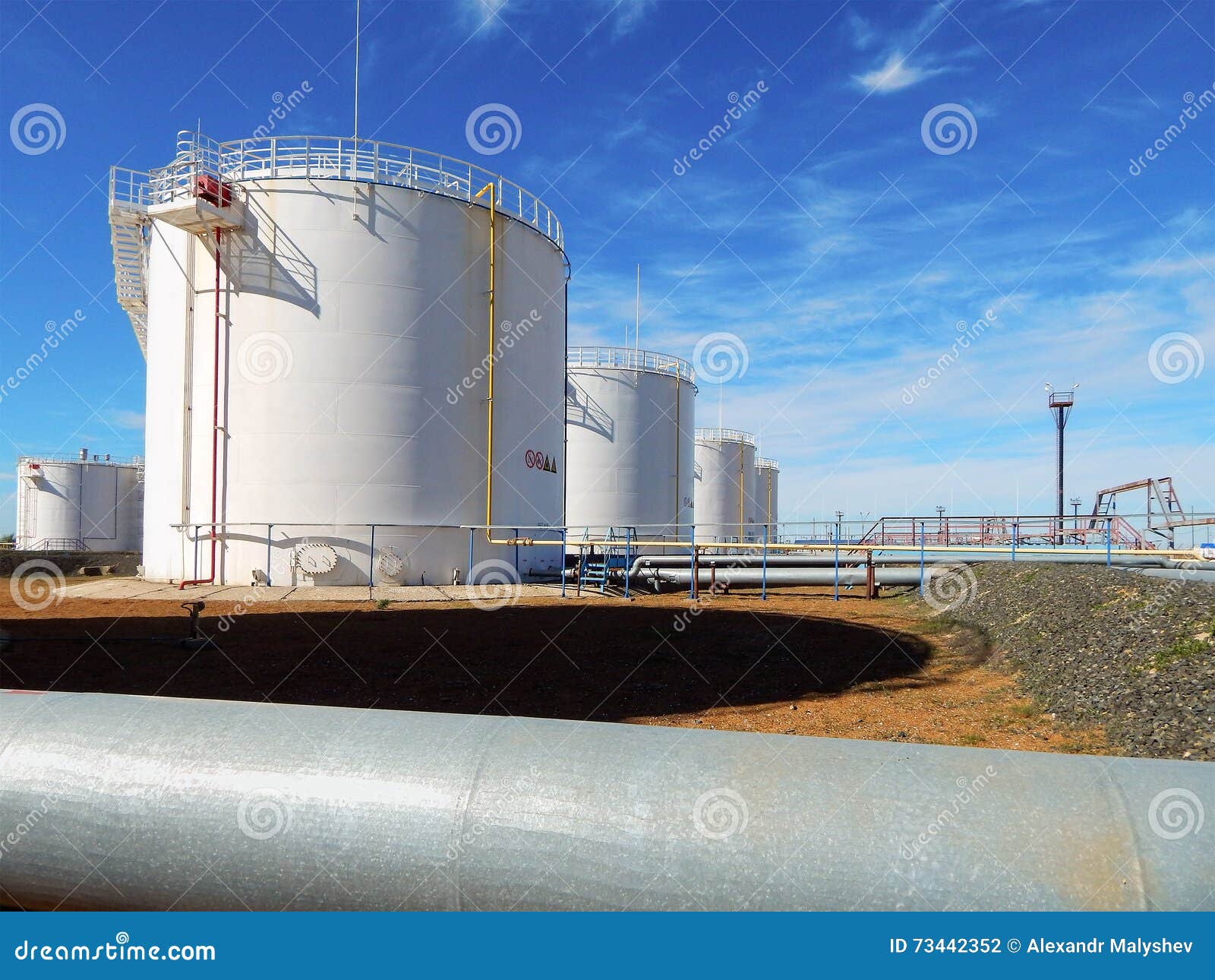Vertical tanks. stock photo. Image of vertical, petrochemical - 73442352