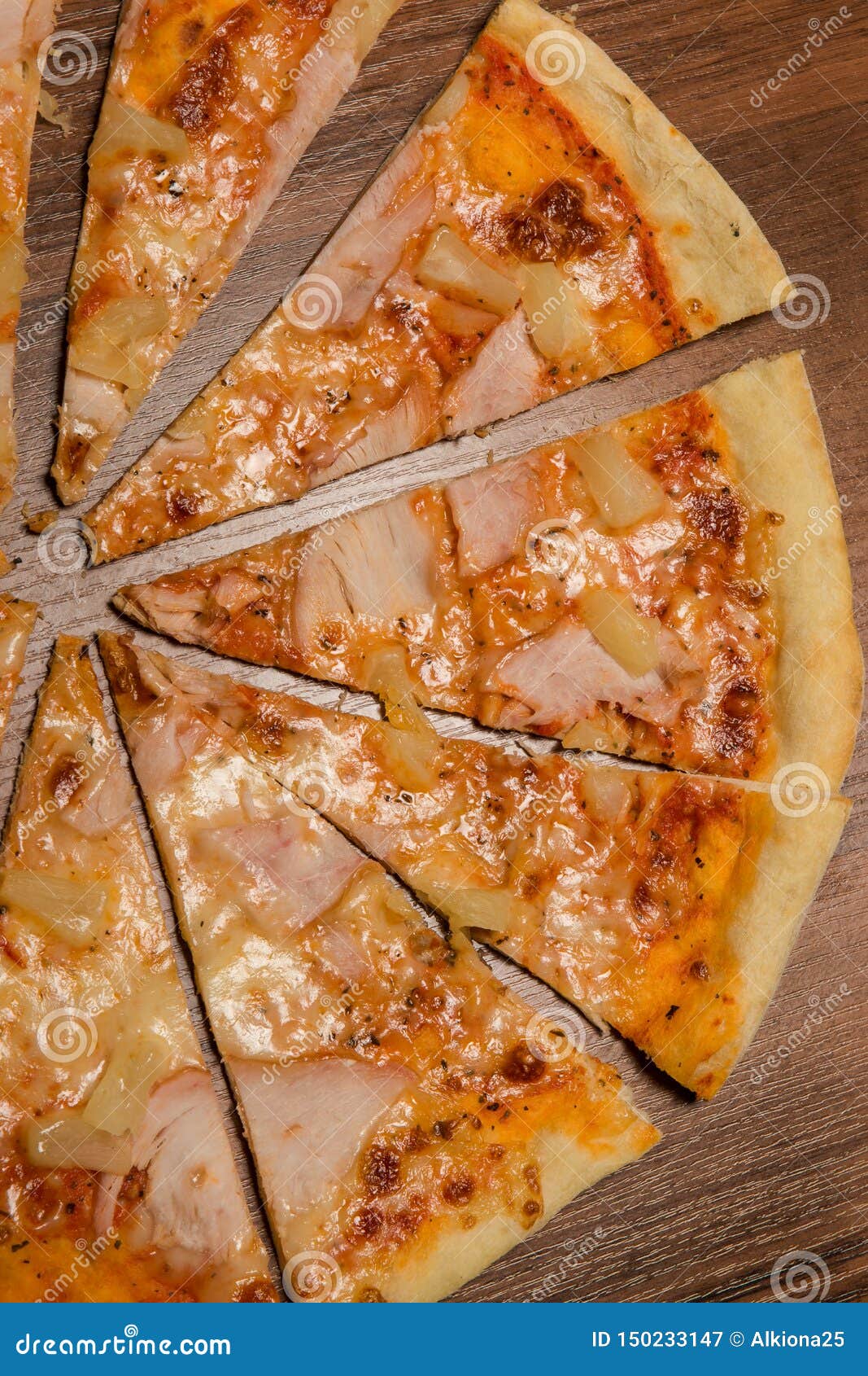 Vertical Top View Closeup Sliced Pizza with Prosciutto and Pineapple ... Vertical Top View Closeup Sliced Pizza with Prosciutto and Pineapple ...