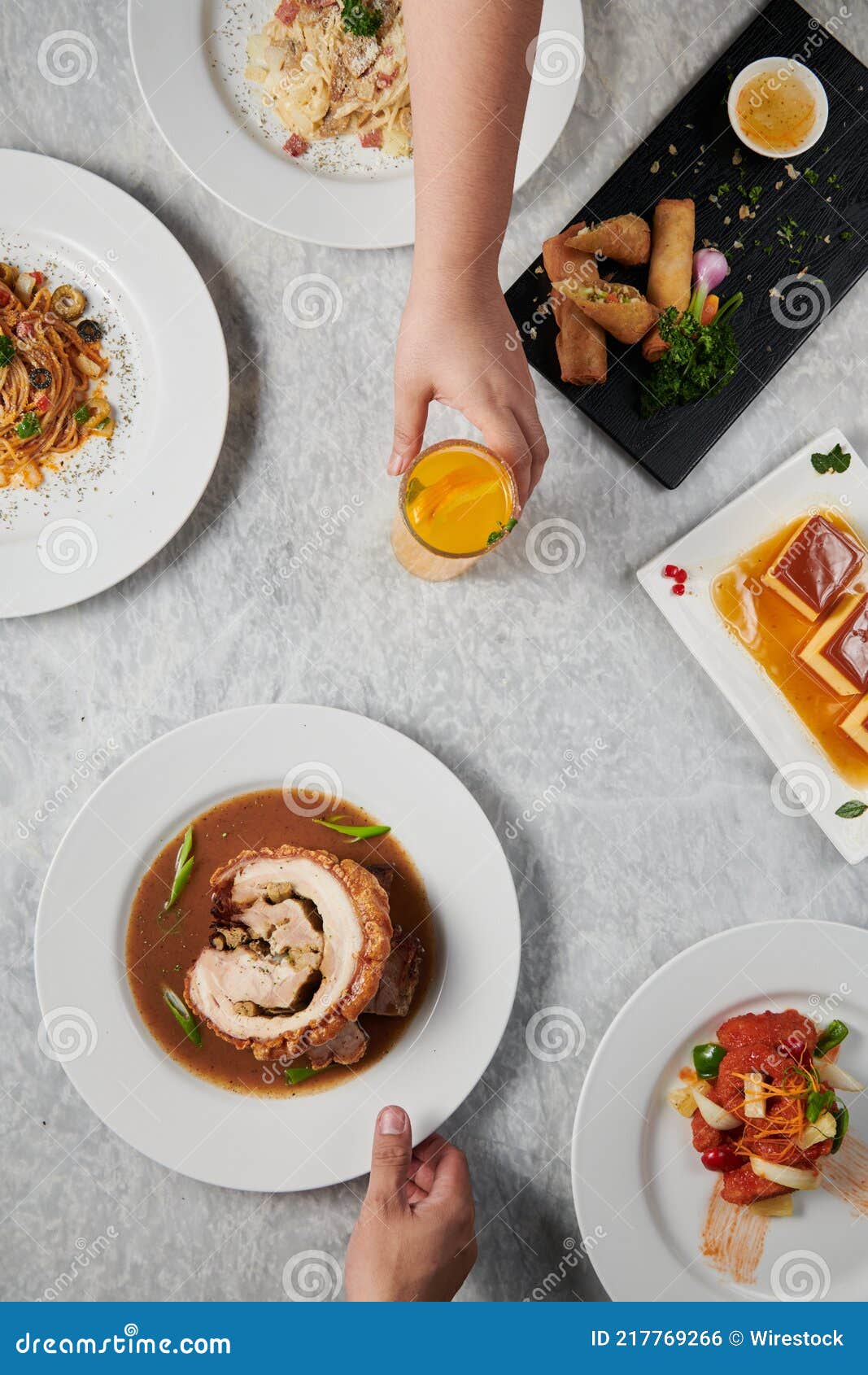 Vertical Top View of Different Decorated Dishes Served on Plates on the ...