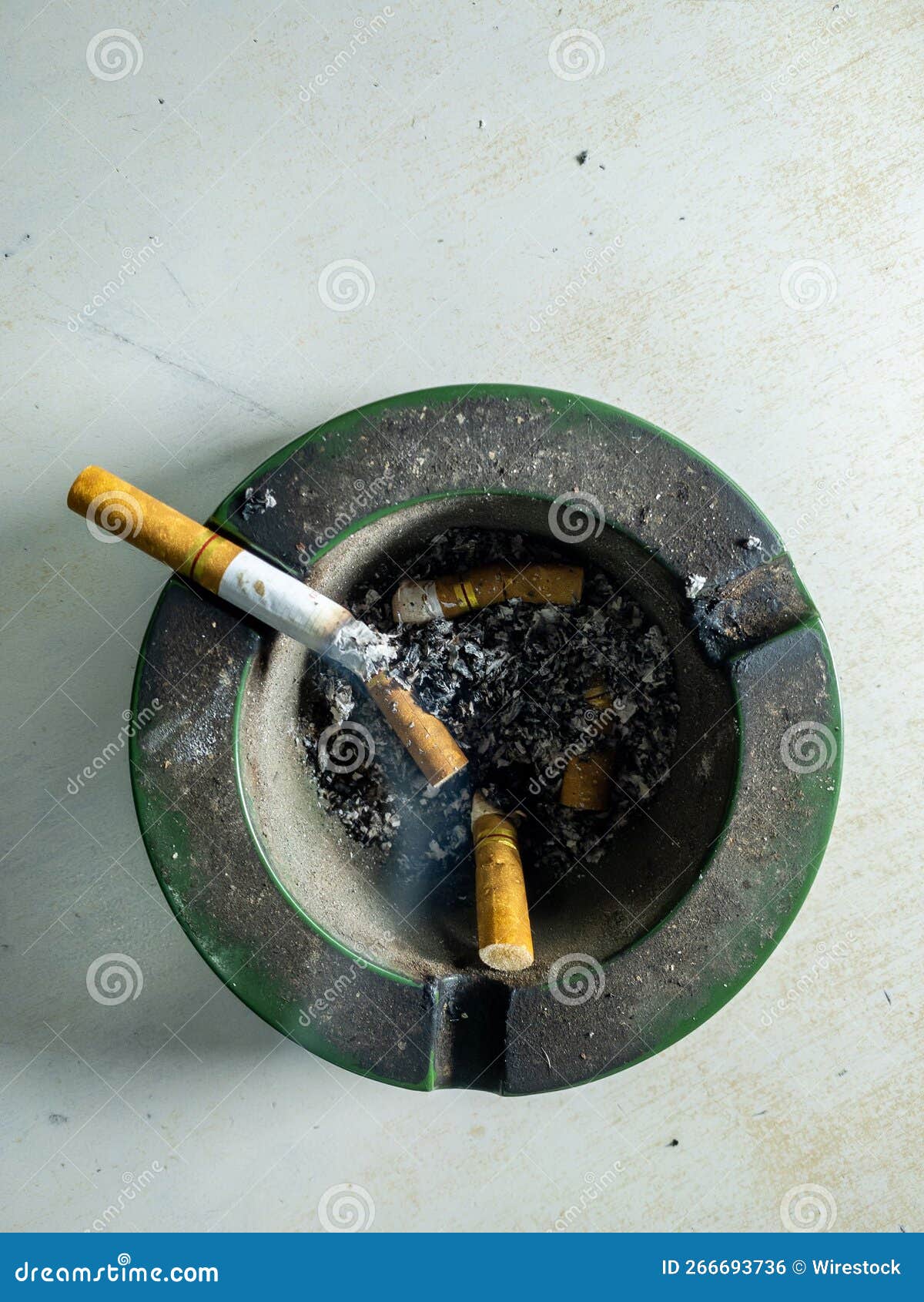 Vertical Top View of a Smoking Cigarette on an Ashtray Stock Photo ...