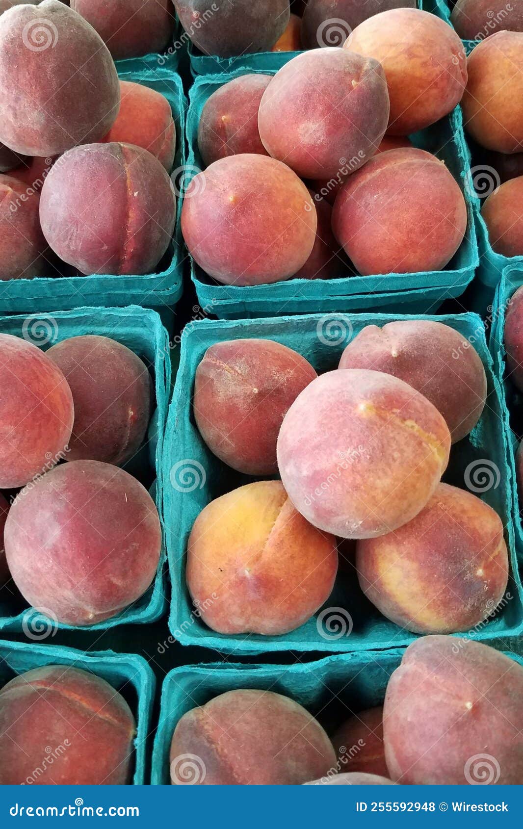 Vertical Top View of Stack of Juicy Peaches in Blue Boxes in the Market ...