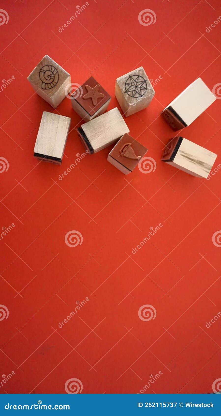 Vertical Top View of Wooden Cubes with Signs on a Red Background Stock ...