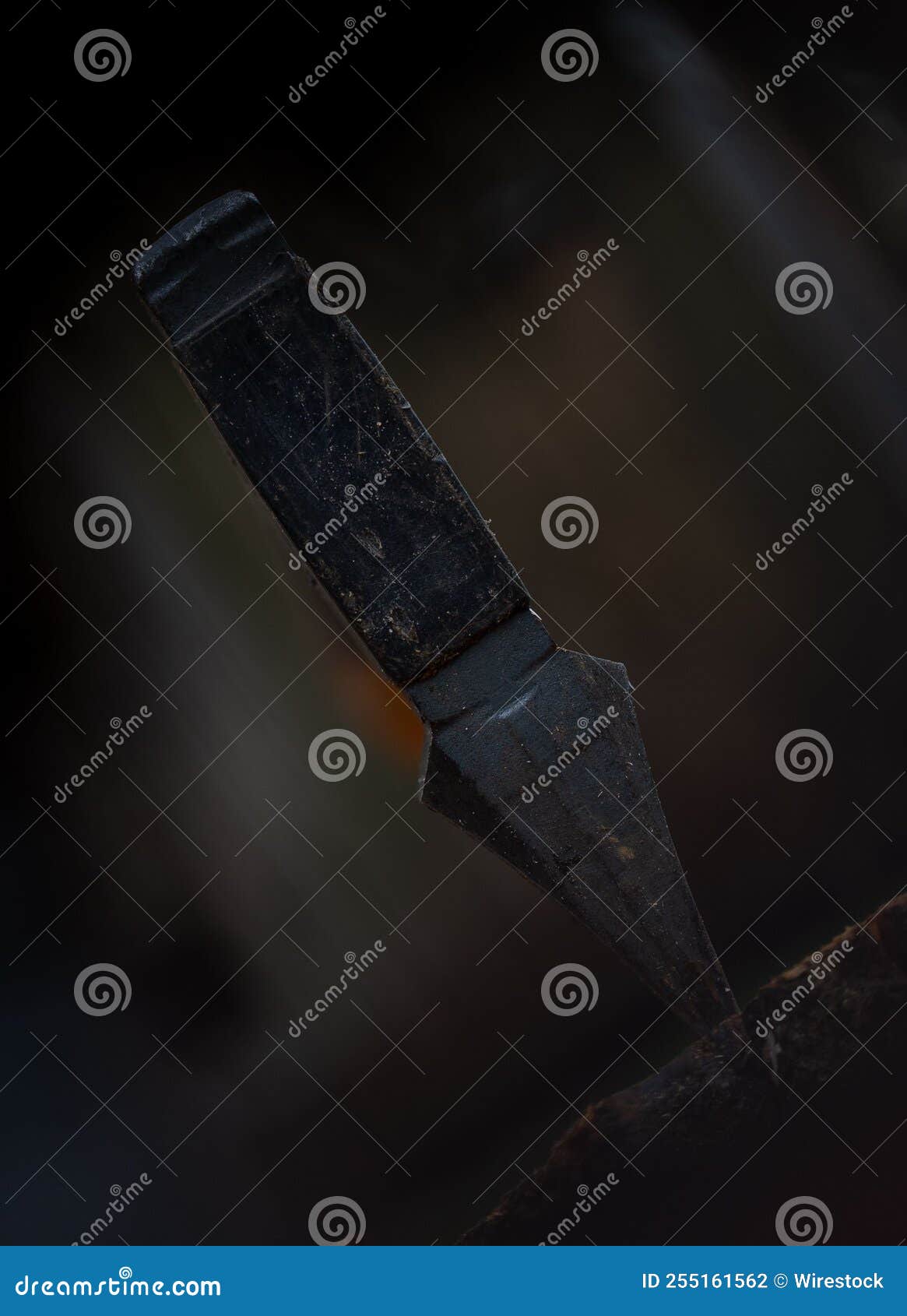 Vertical of an Upright Dagger Dug in Wood Stock Photo - Image of ...