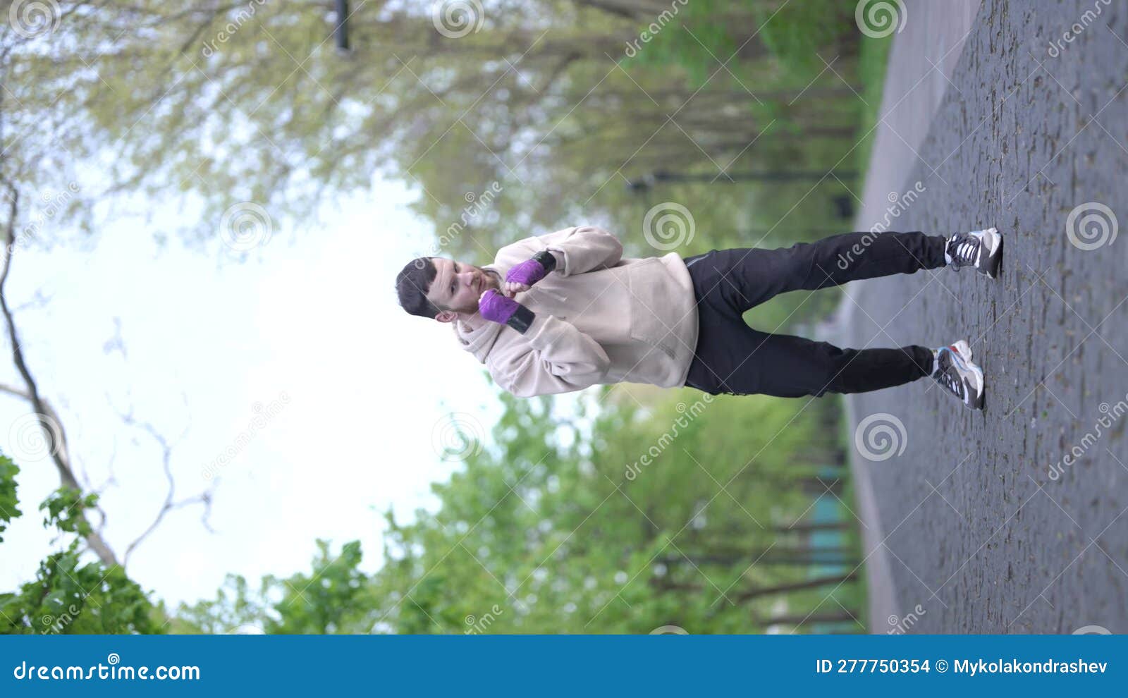 Vertical Video of an Athlete Guy Boxer Who is Training Stock Footage ...