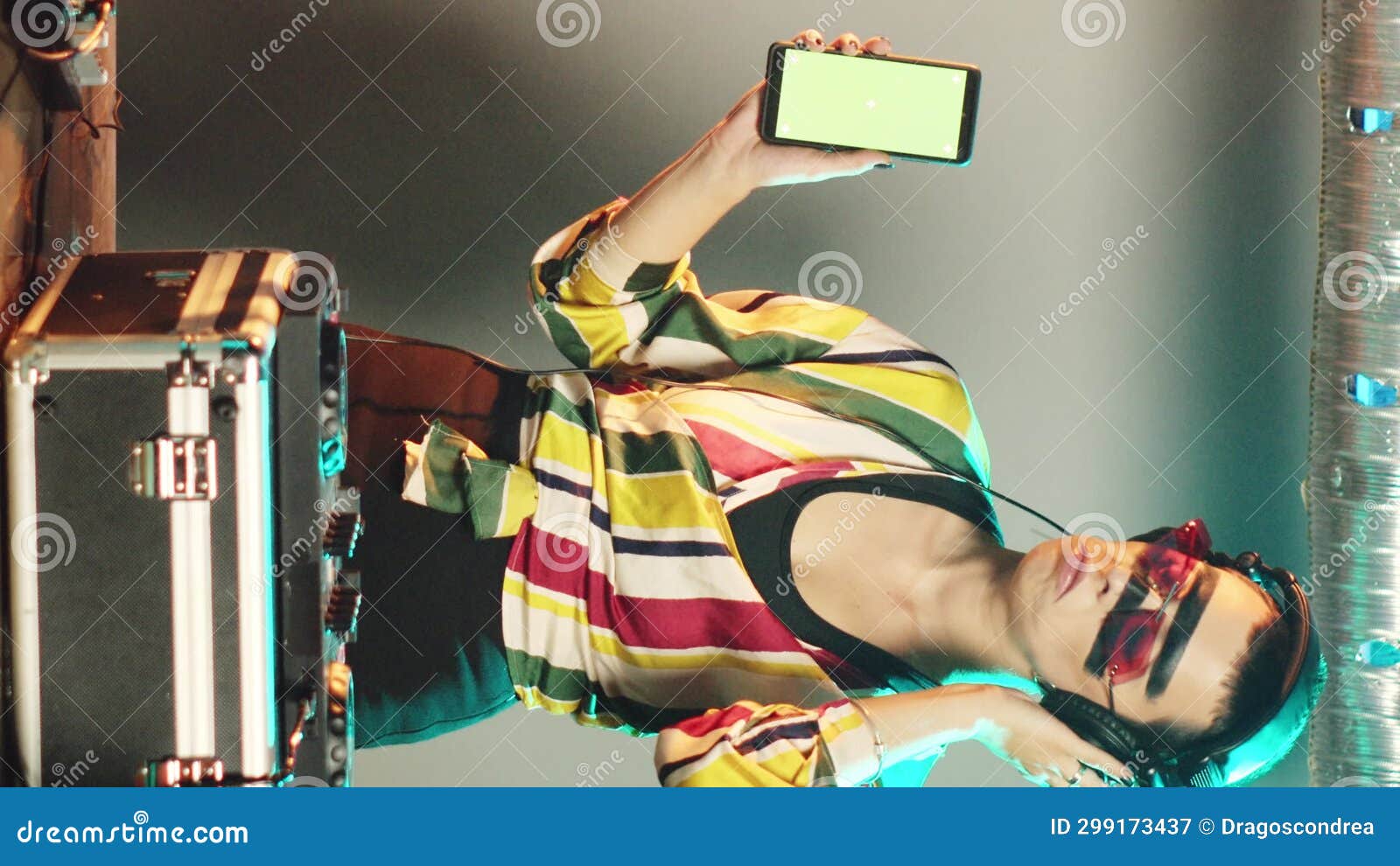 Vertical Video DJ Performer Points at Greenscreen Display Stock Video ...