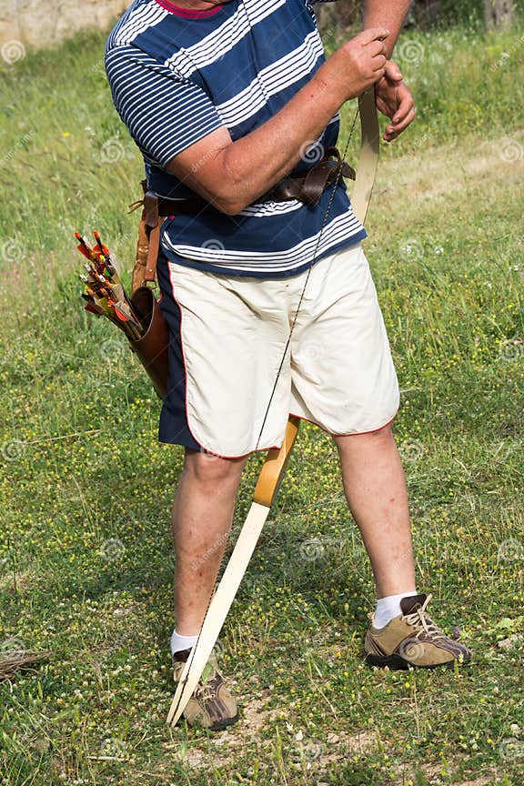 Vertical View of an Archery Teacher during a Lesson Explaining H Stock ...