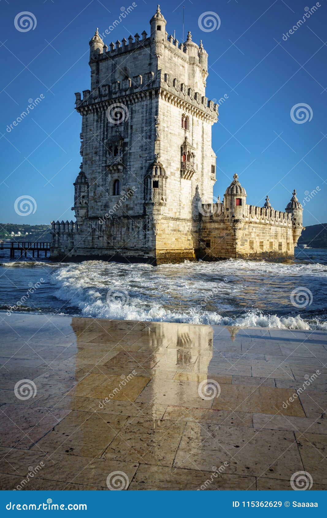 Vertical View of the Belem Tower and Reflection at the Riverside of ...