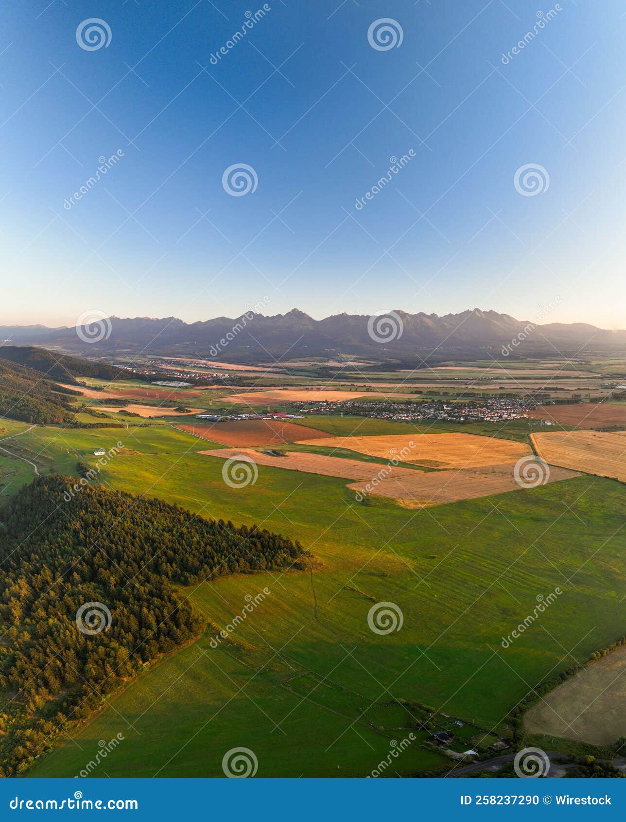Vertical View of Fields with Mountain Range in the Background in the ...