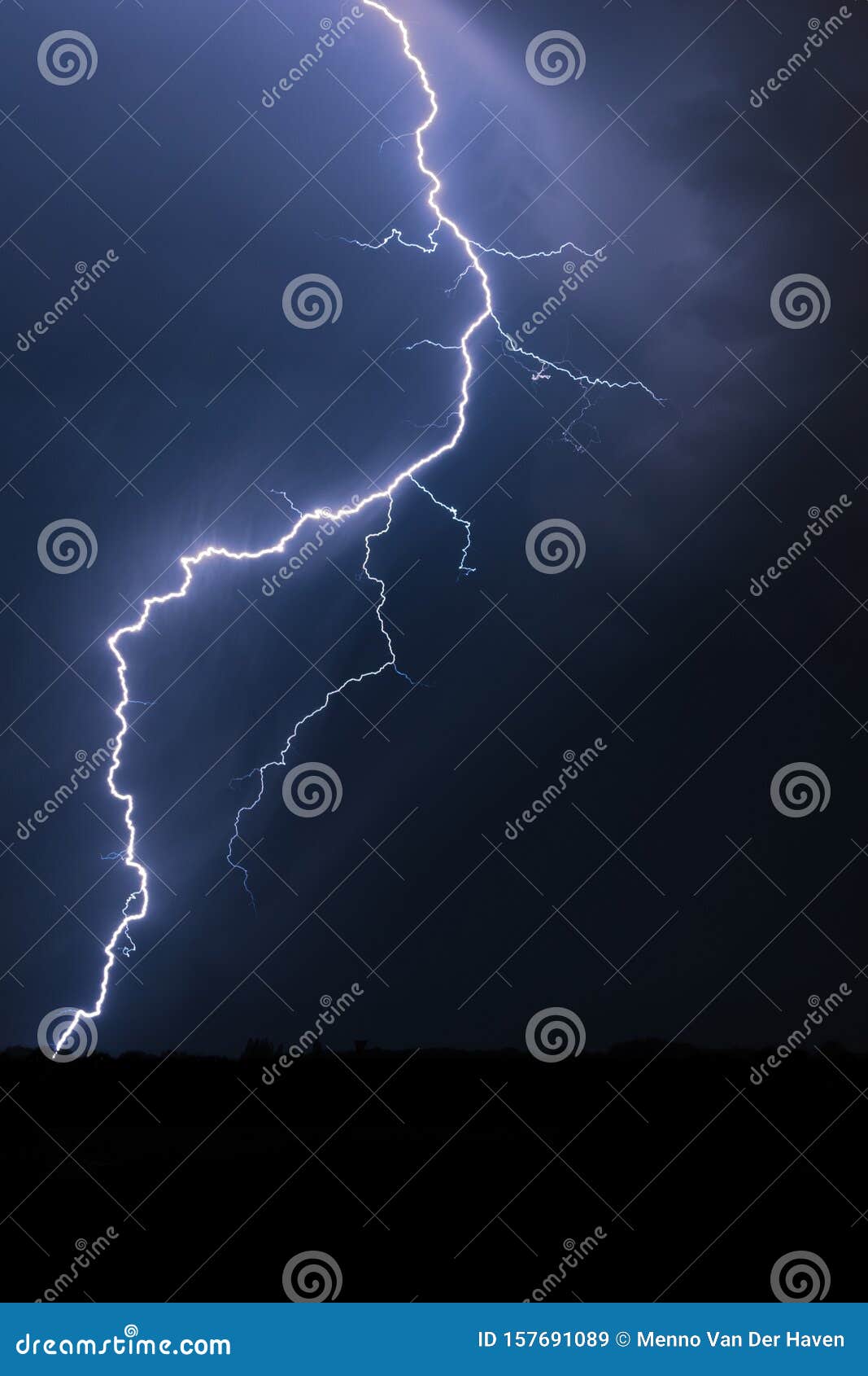 Vertical View of Forked Lightning Bolt Striking Down To Earth Stock ...