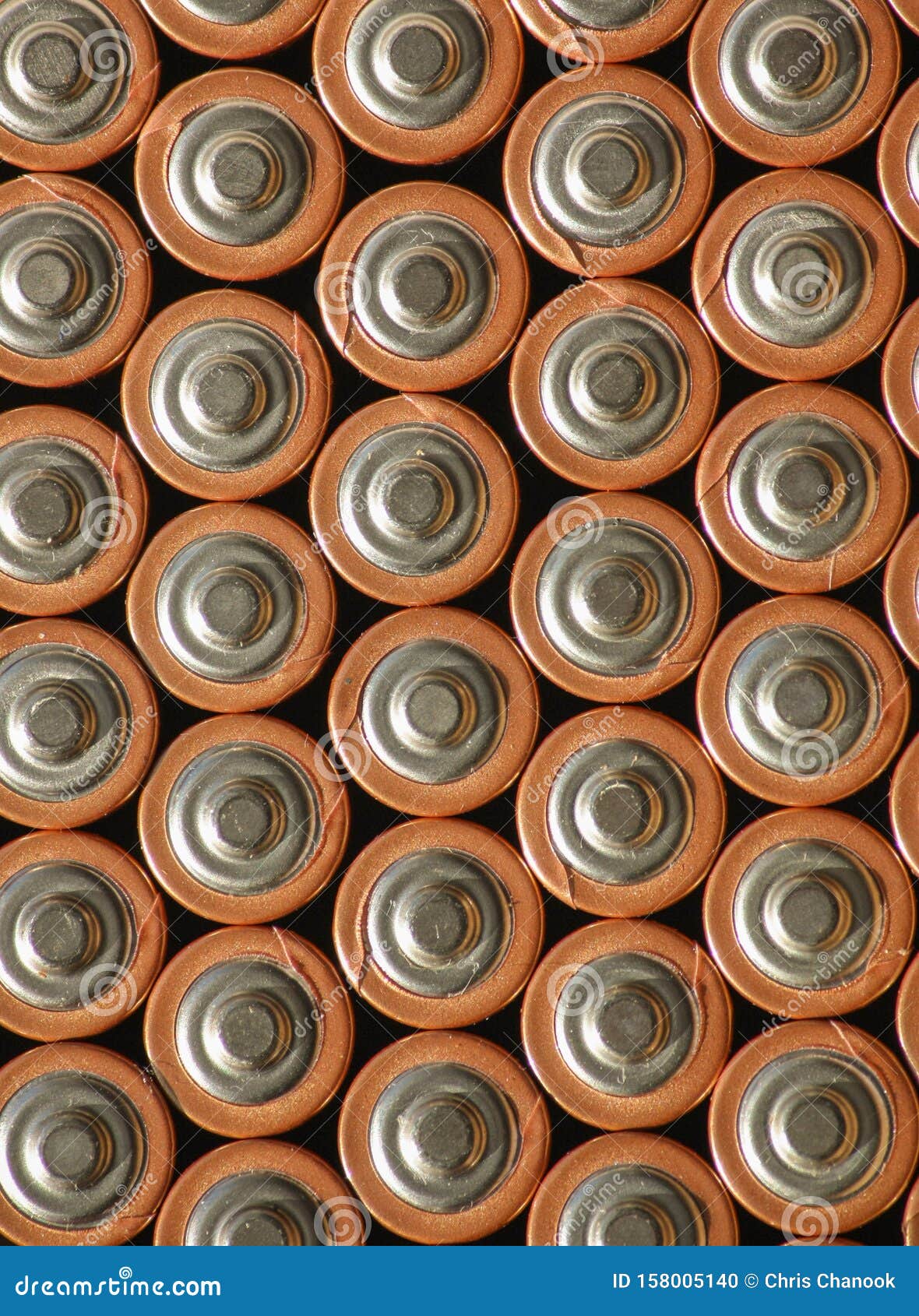 Copper Top Batteries Grouped Together To Form A Background Of Positive ...