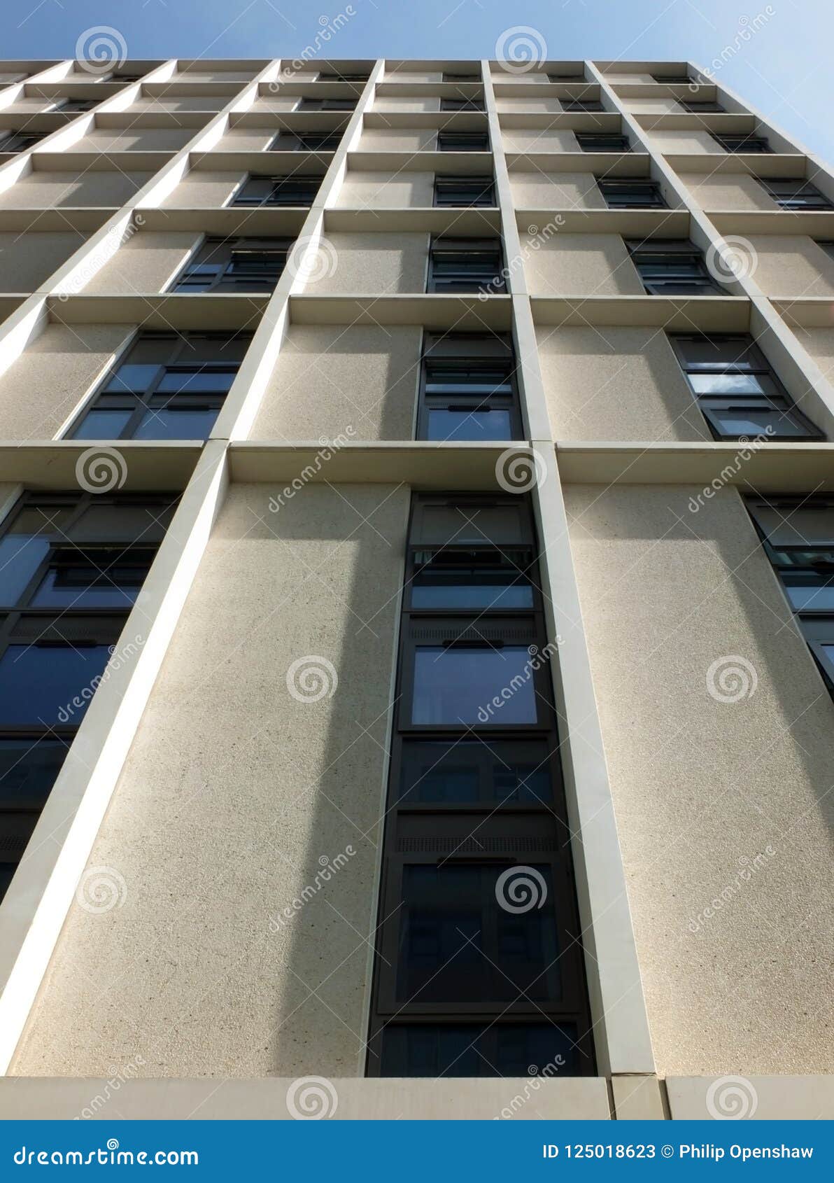 Vertical View of a Tall Concrete Angular Modern High Building with ...