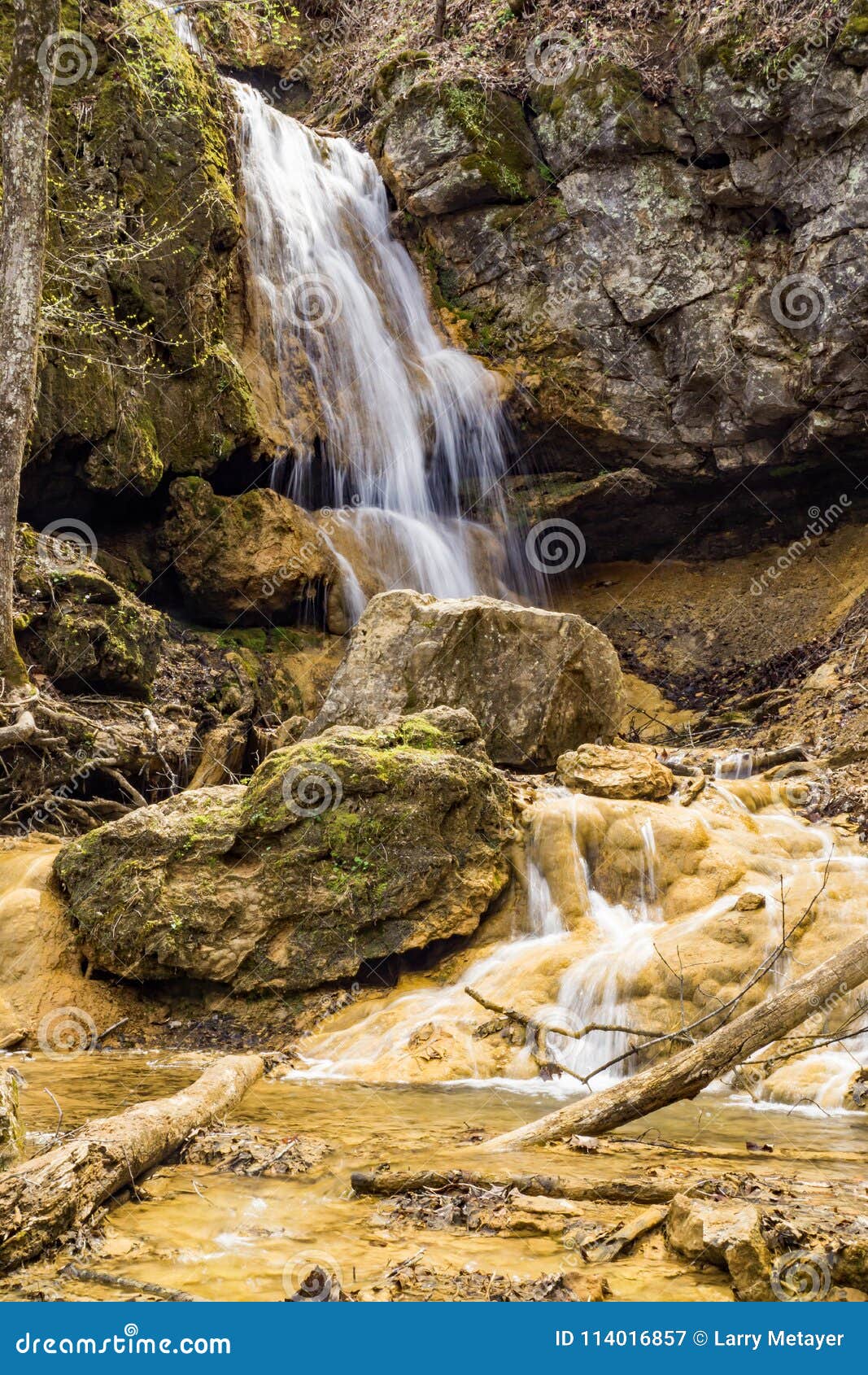 A Vertical View of a Travertine Waterfall Stock Image - Image of cave ...