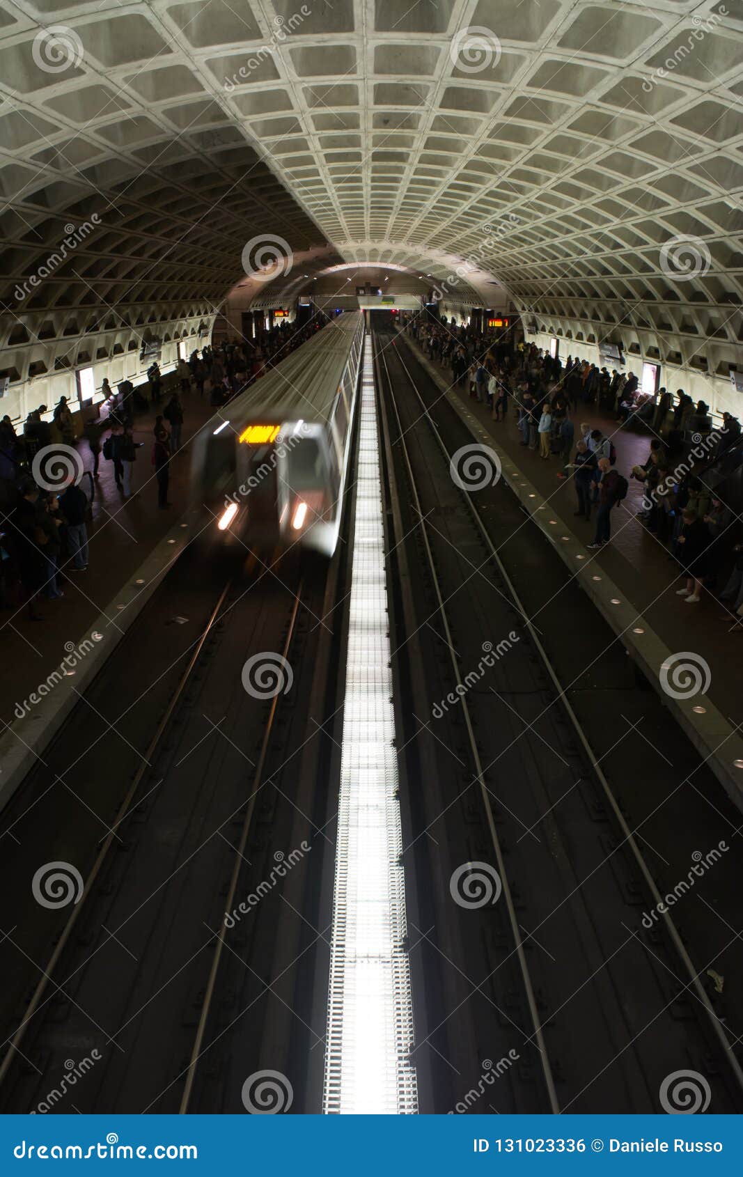 Vertical View of the Washington Underground with a Running Train ...