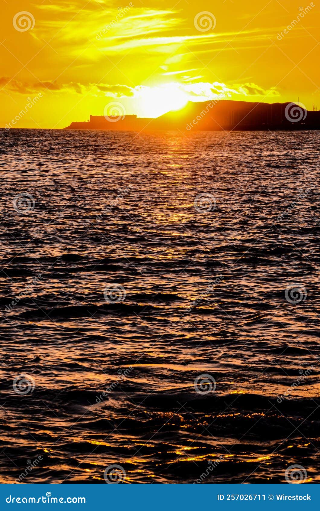 Vertical View of Water Waves before the Hill Under the Sunset Sky Stock ...