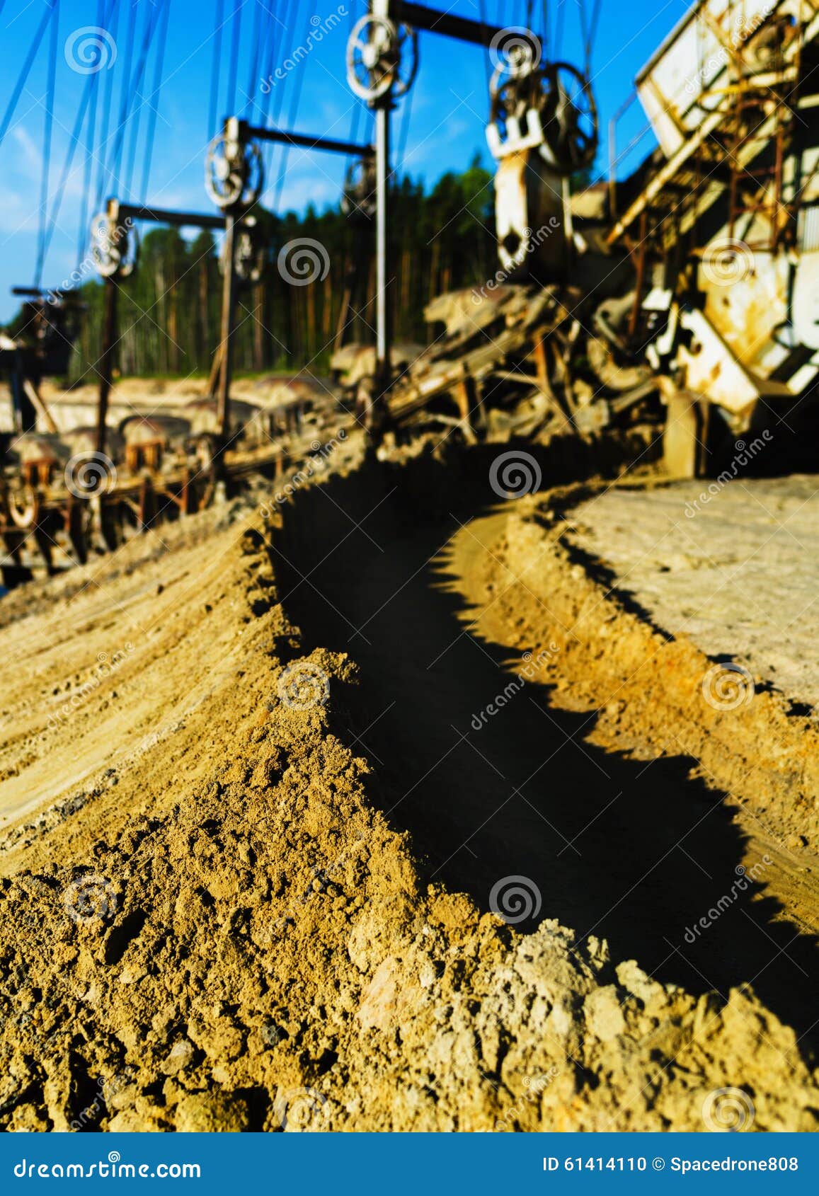 Vertical Vivid Sand Mining Machine Stock Photo - Image of format ...