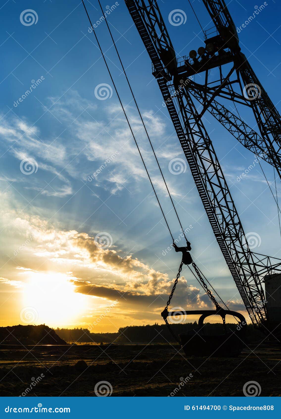 Vertical Vivid Sand Mining Machine Silhouette Stock Photo - Image of ...