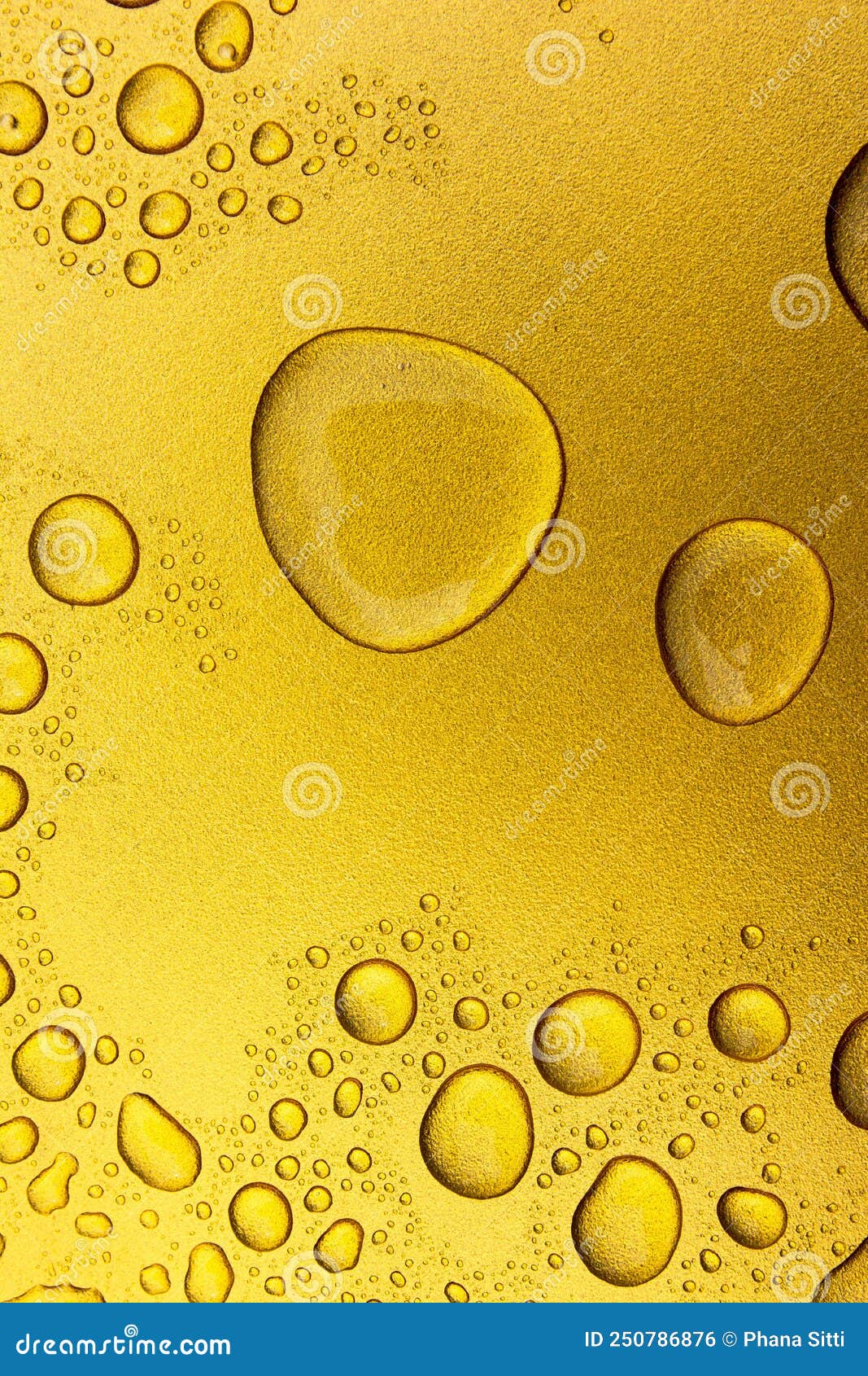Vertical Water Drop on Gold Texture Background. Water Droplet on Gold ...