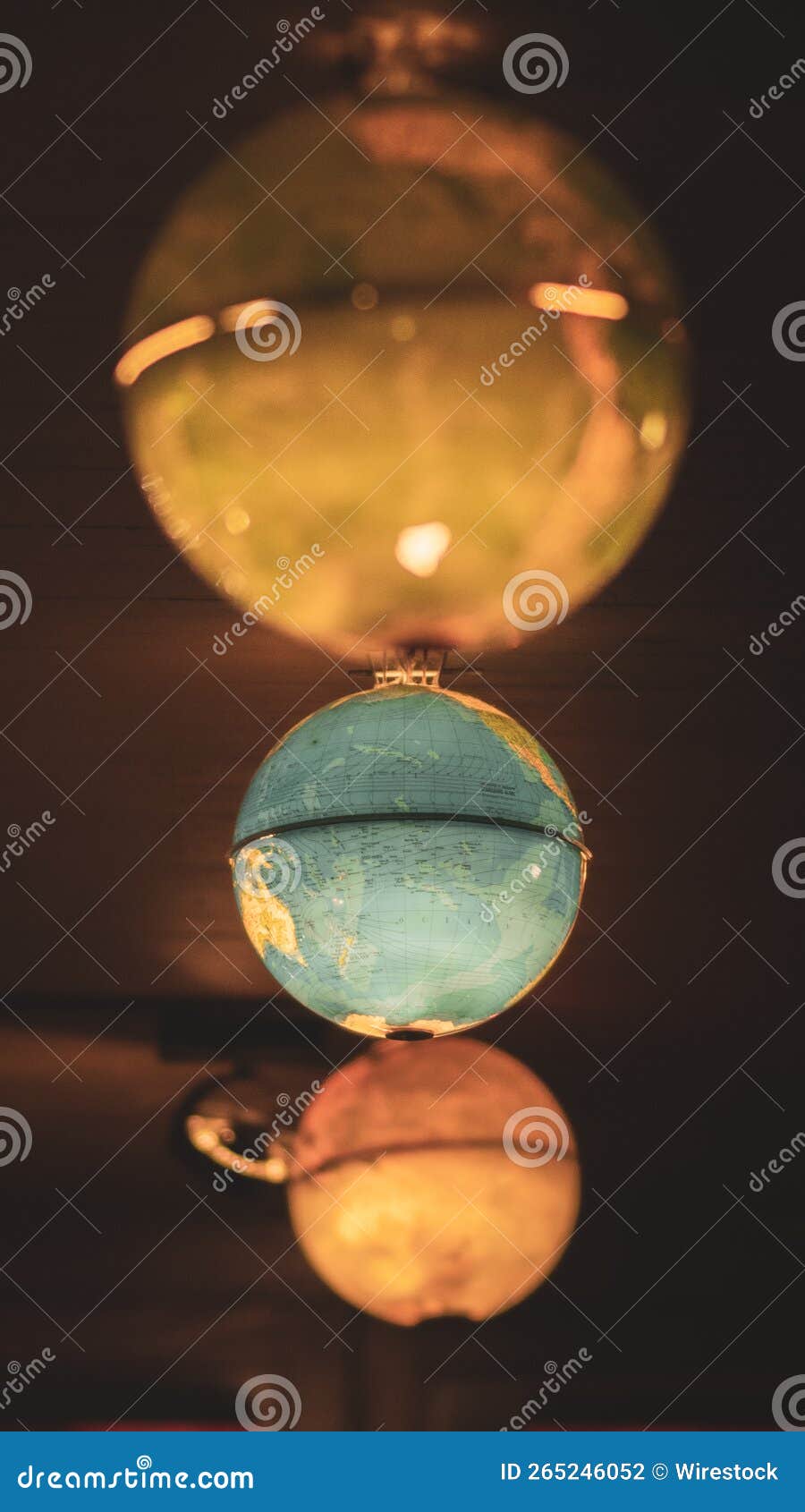 Vertical of a World Globes, Globuses Upside Down Stock Photo - Image of ...