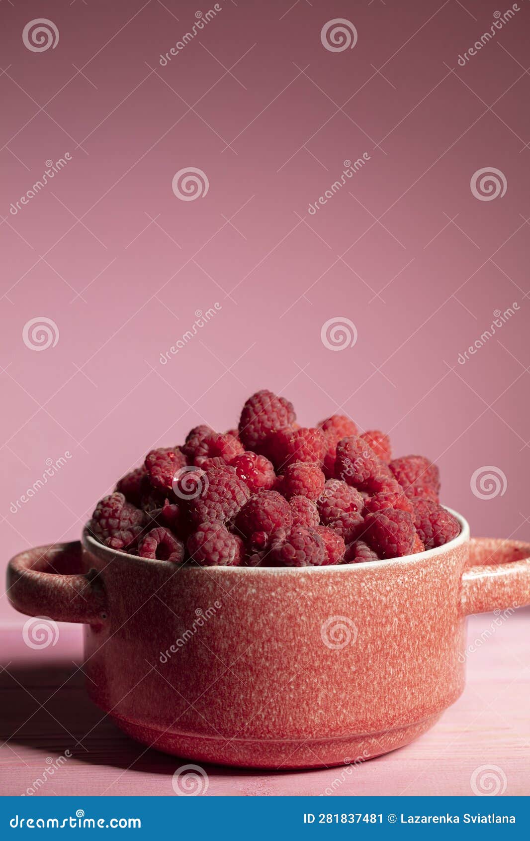Vertically Raspberries in a Clay Bowl Stock Image - Image of eating ...