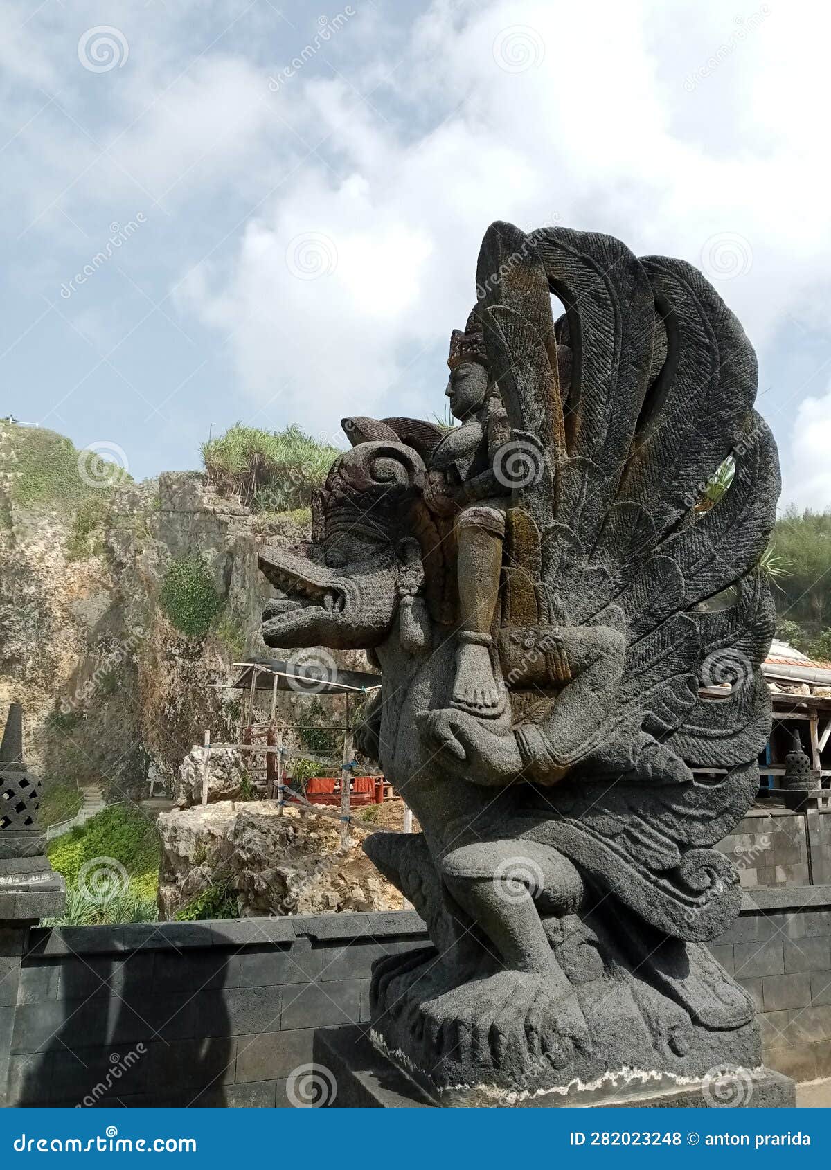 A Very Beautiful Stone Statue Installed on the Beach Stock Photo ...